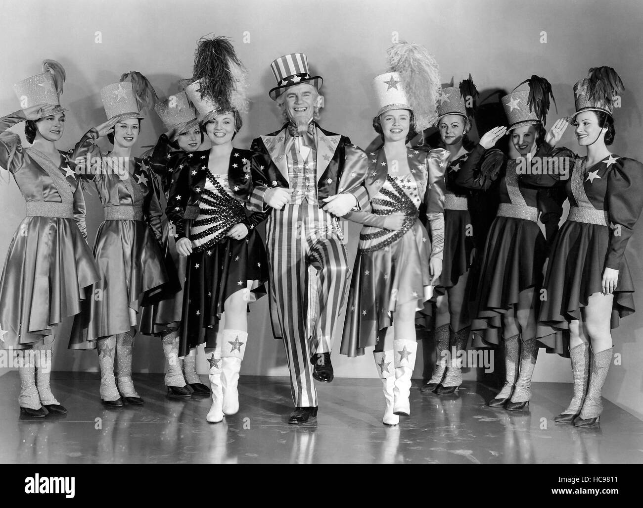YANKEE DOODLE DANDY, Walter Huston and chorus girls, 1942 Stock Photo ...
