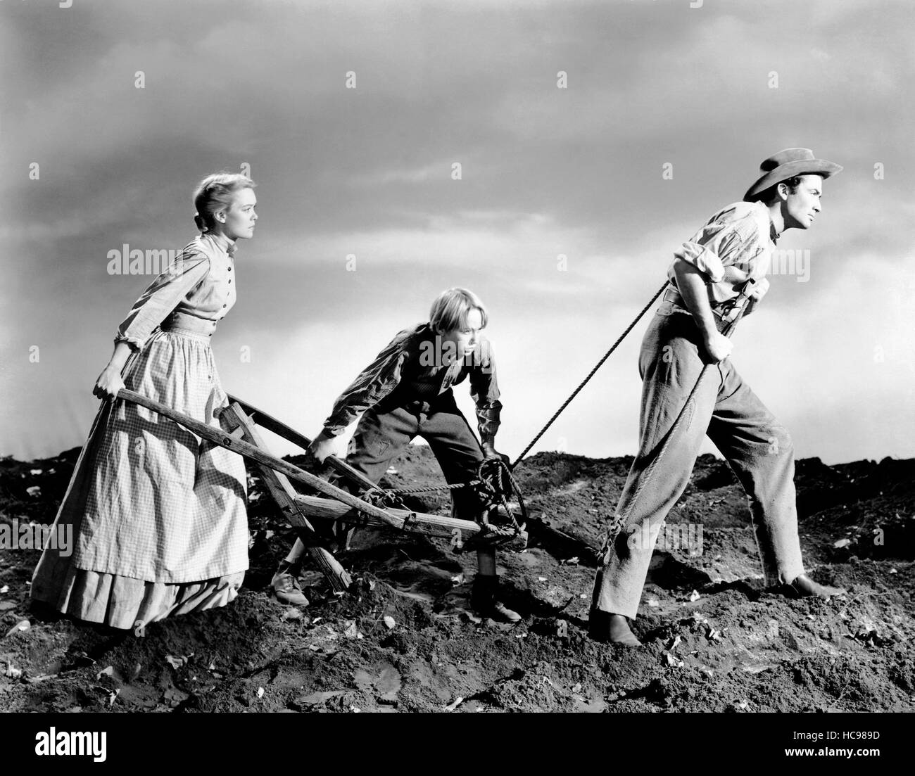 THE YEARLING, from left, Jane Wyman, Claude Jarman, Jr., Gregory Peck ...
