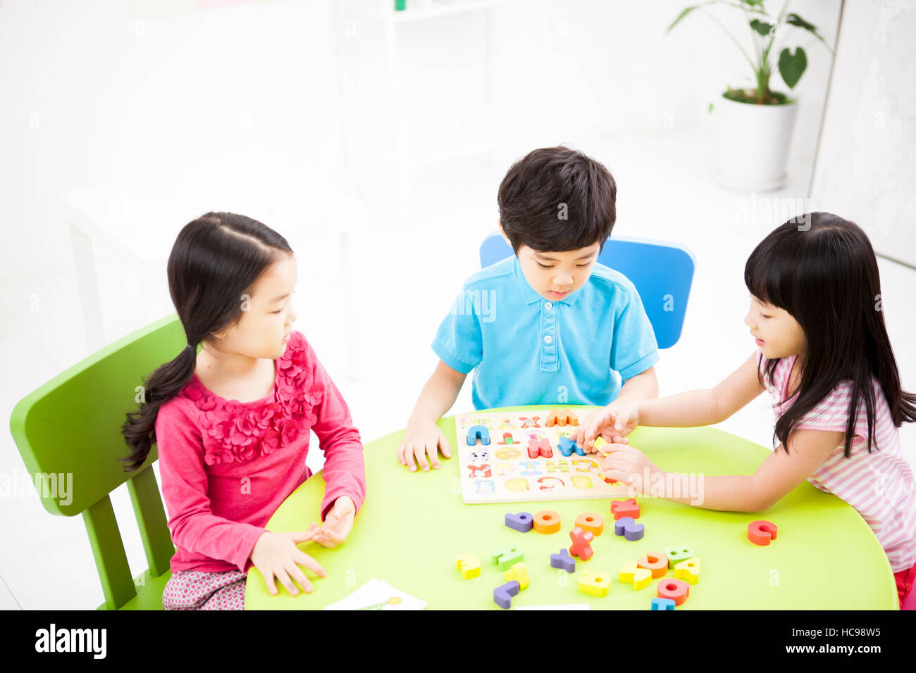 Children playing game table hi-res stock photography and images - Alamy