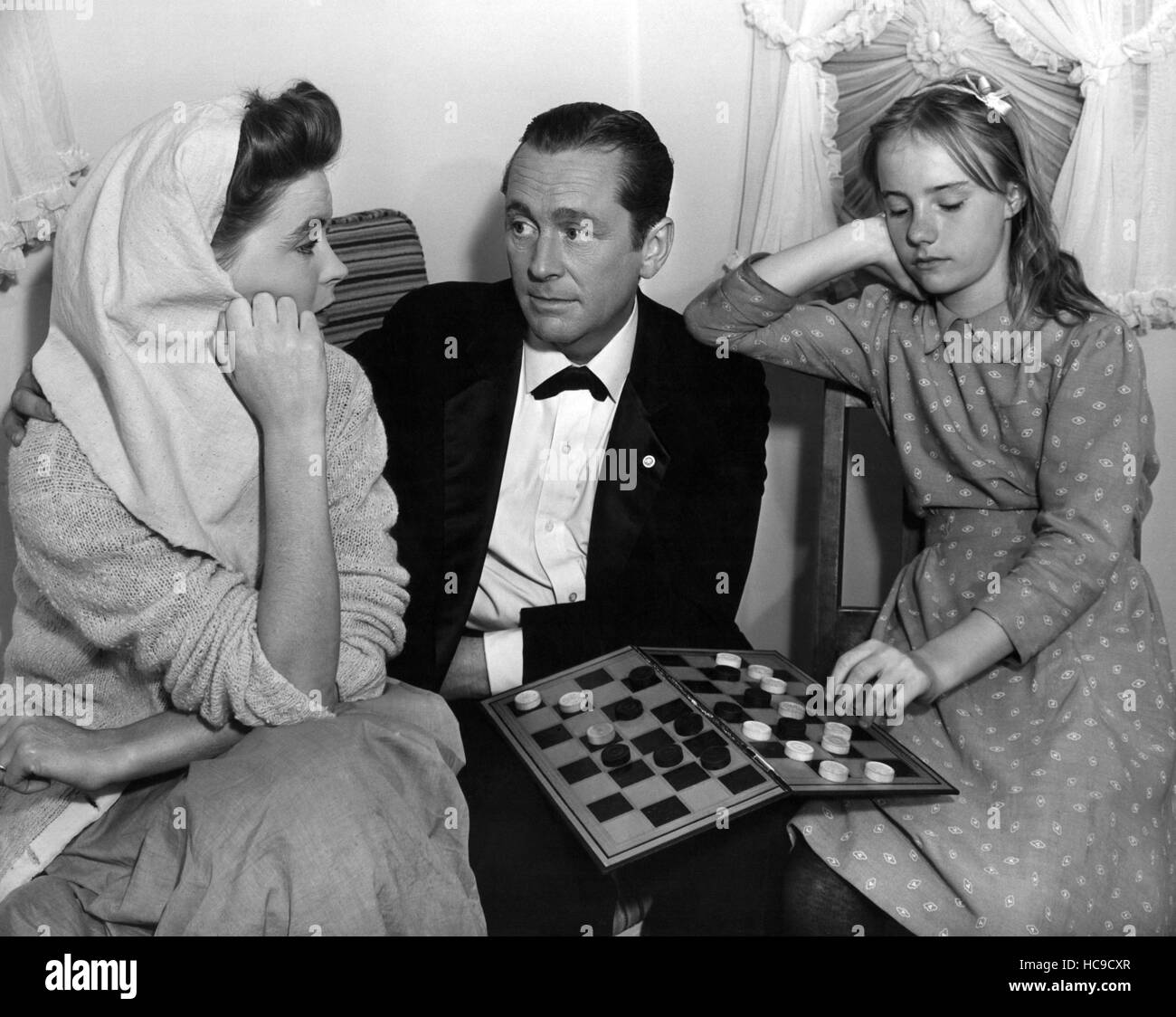 A TREE GROWS IN BROOKLYN, Dorothy McGuire, James Dunn and Peggy Ann Garner relax on set, 1945 ...