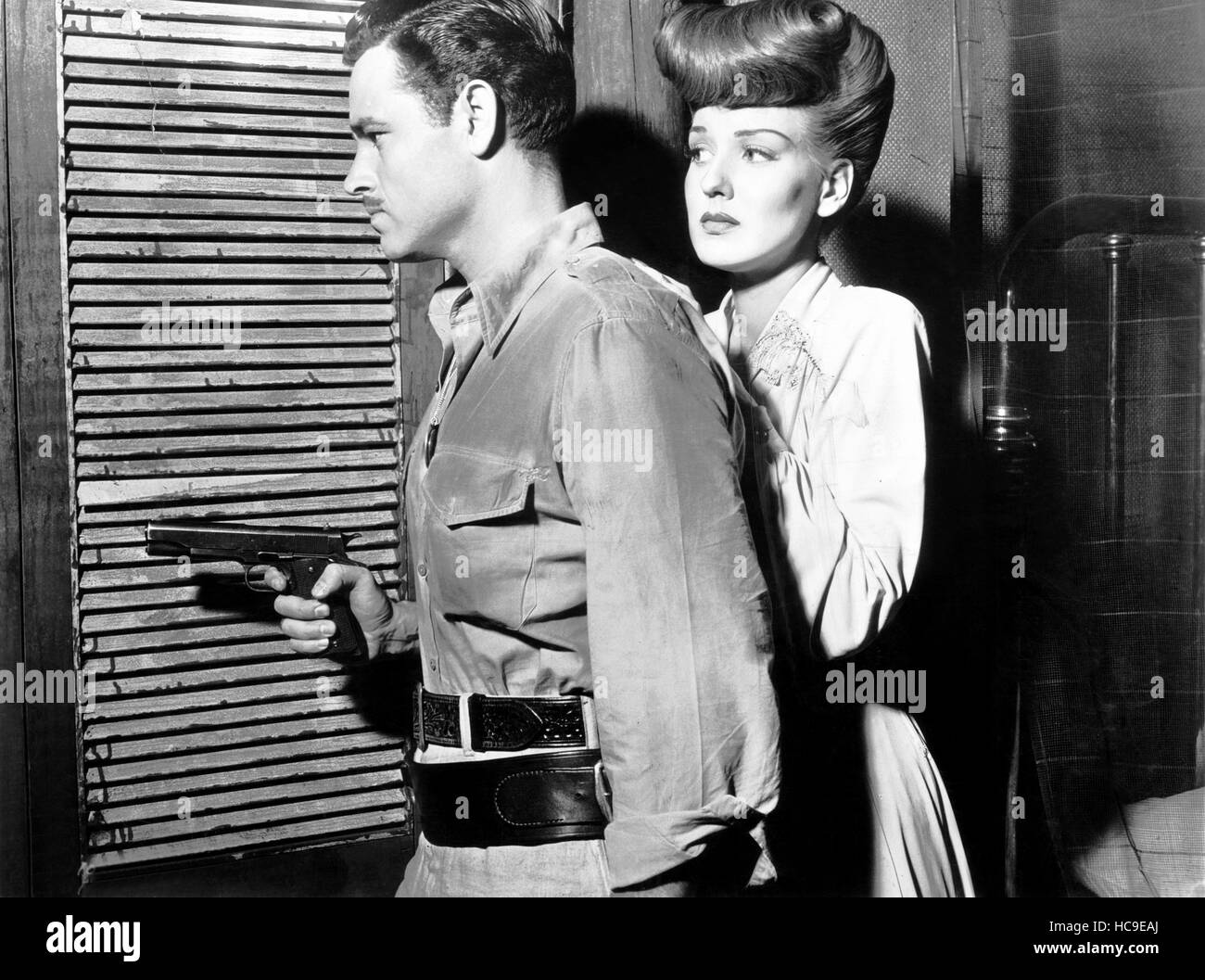 TWO-MAN SUBMARINE, from left, Tom Neal, Ann Savage, 1944 Stock Photo ...