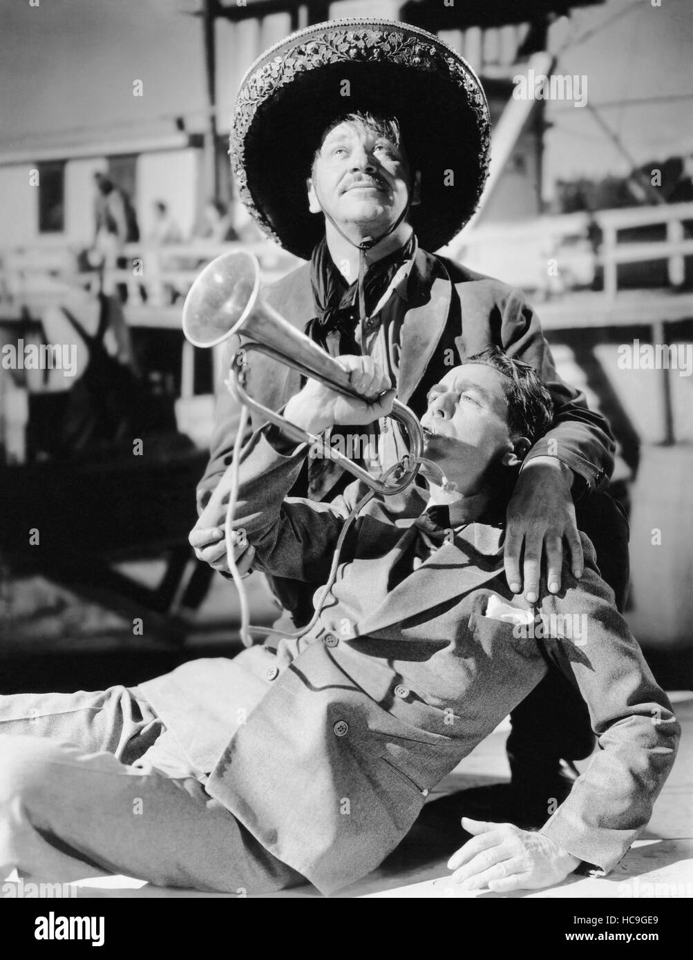 VIVA VILLA, director Jack Conway, bottom, shows Wallace Beery how to ...