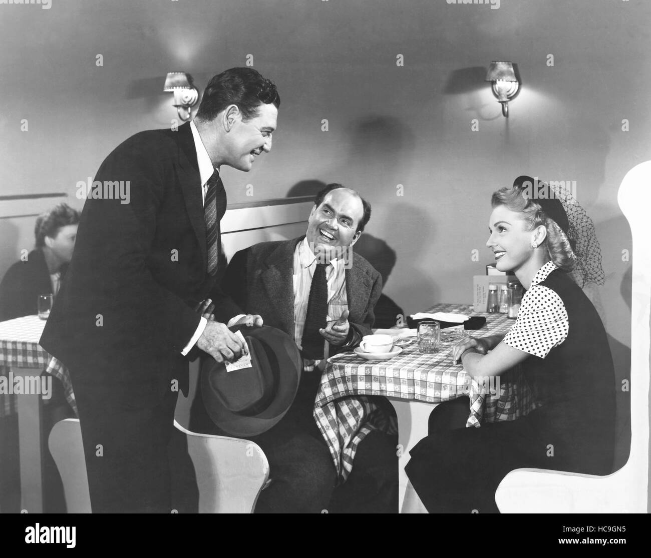 THE VOICE OF THE WHISTLER, from left: Richard Dix, Rhys Williams, Lynn Merrick, 1945 Stock Photo ...