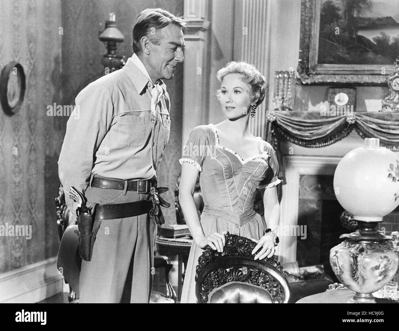 WESTBOUND, from left: Randolph Scott, Virginia Mayo, 1959 Stock Photo ...