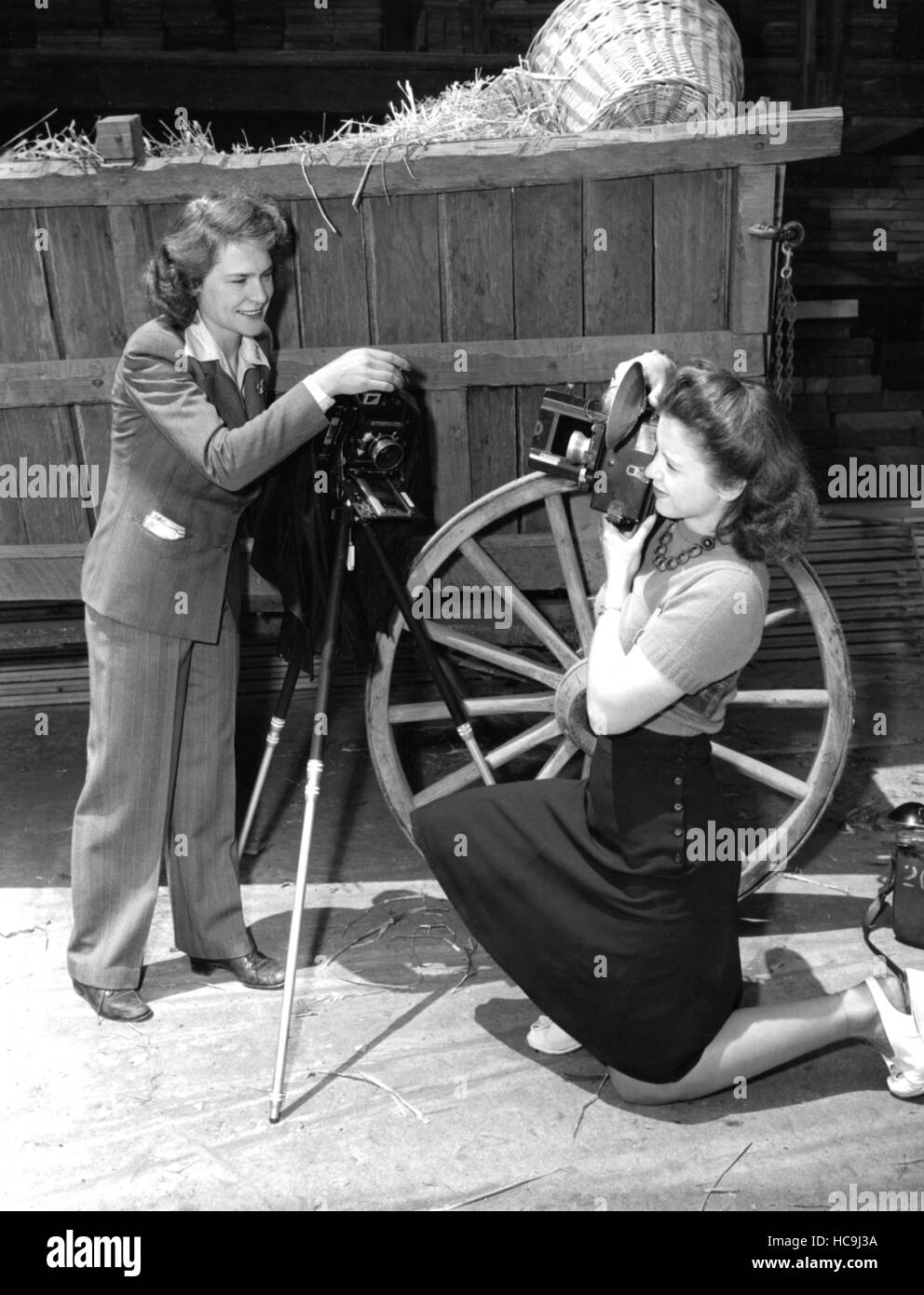 THE WESTERNER, Margaret Bourke-White and Helen Brush on set, 1940 Stock ...