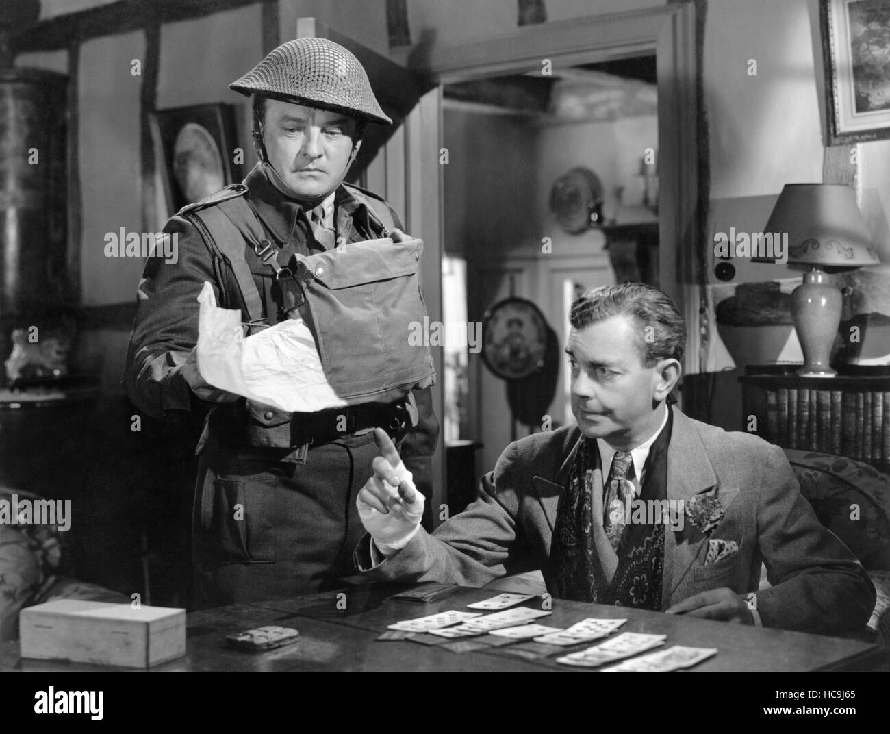 WENT THE DAY WELL?, from left: Basil Sydney, Leslie Banks, 1942 Stock ...