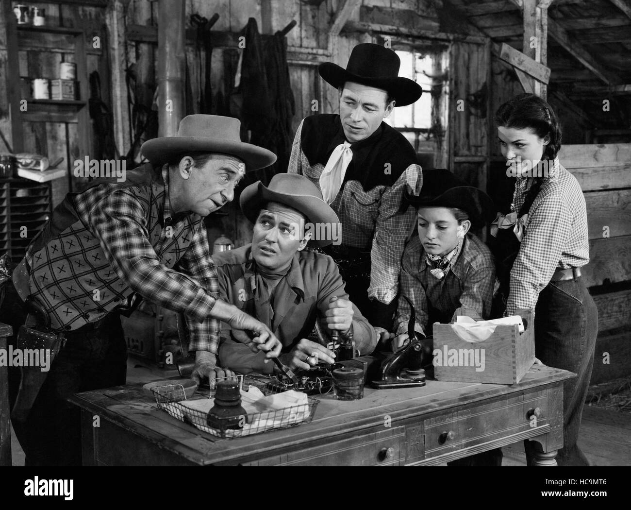 WILD WEST, from left: Roscoe Ates, Lash LaRue, Eddie Dean, Robert Buzz ...
