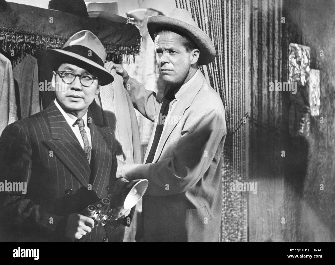 WORLD FOR RANSOM, from left: Keye Lyke, Dan Duryea, 1954 Stock Photo ...