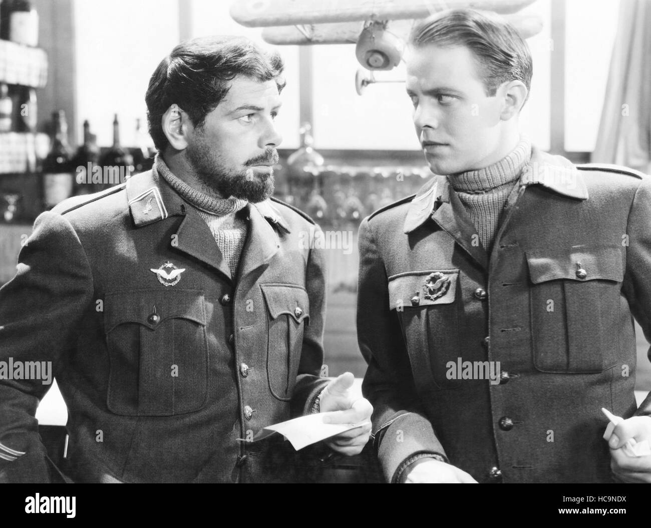 THE WOMAN I LOVE, from left, Paul Muni, Louis Hayward, 1937 Stock Photo ...