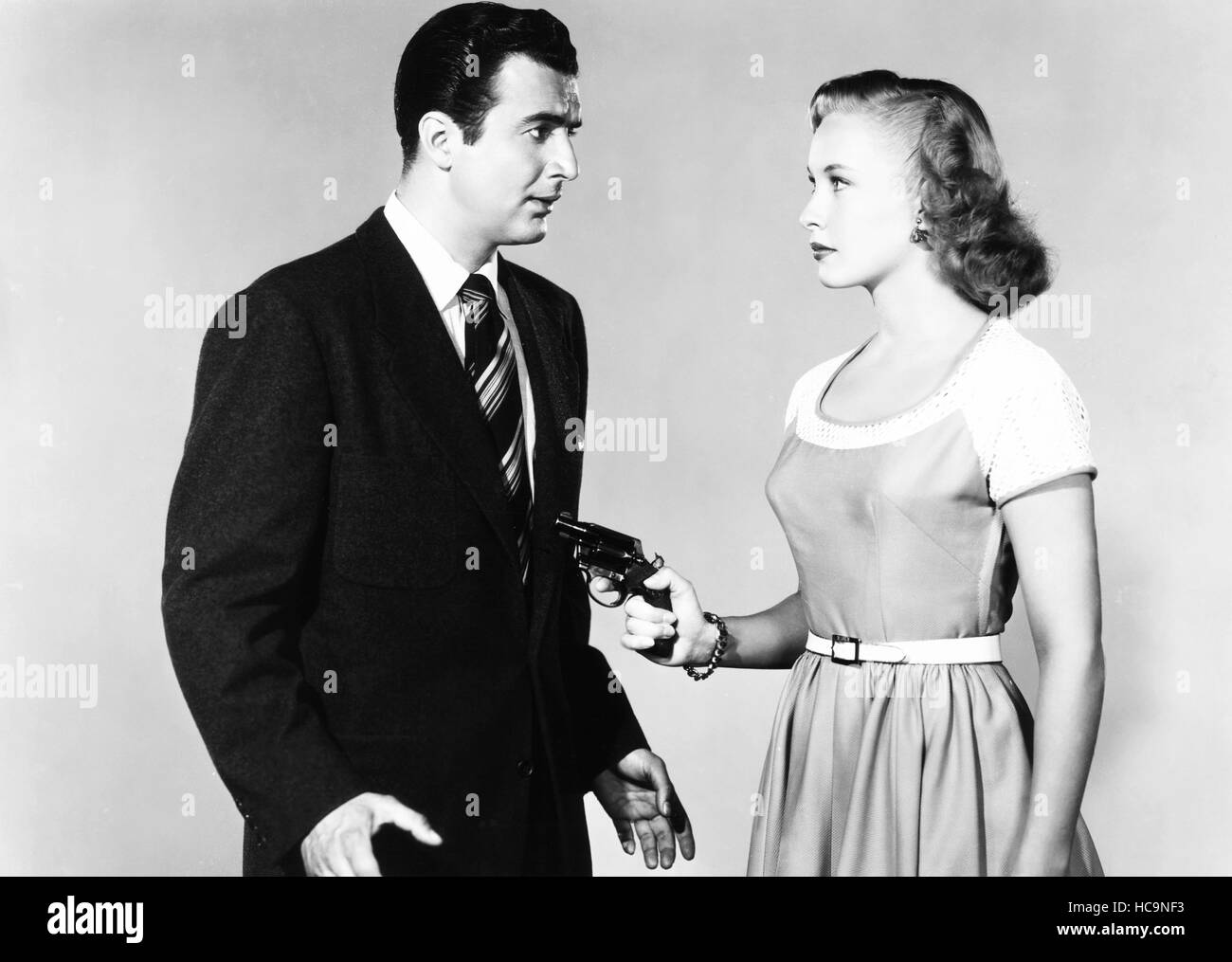 WOMAN IN THE DARK, from left: Rick Vallin, Penny Edwards, 1952 Stock ...
