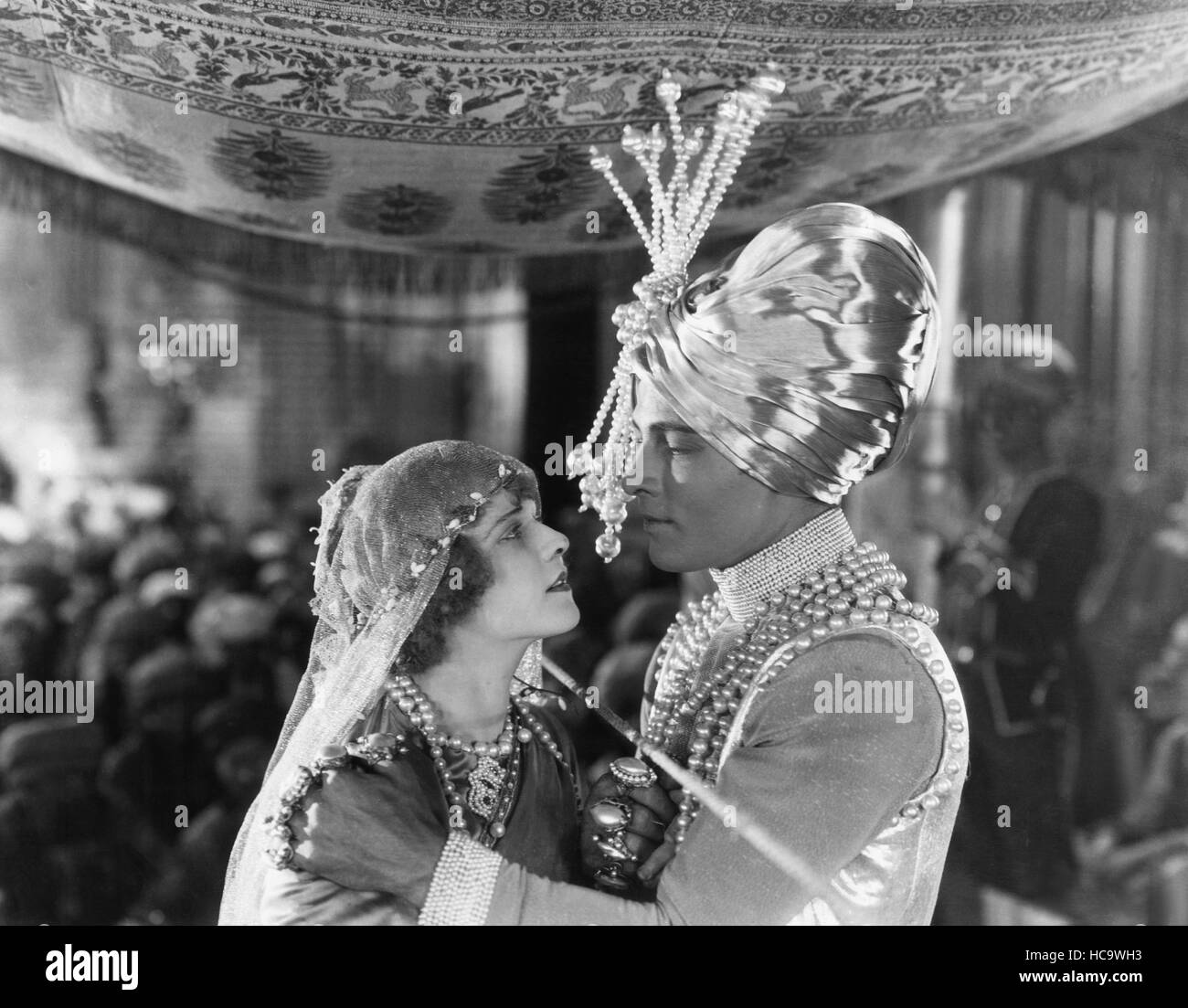 THE YOUNG RAJAH, from left: Wanda Hawley, Rudolph Valentino, 1922 Stock ...
