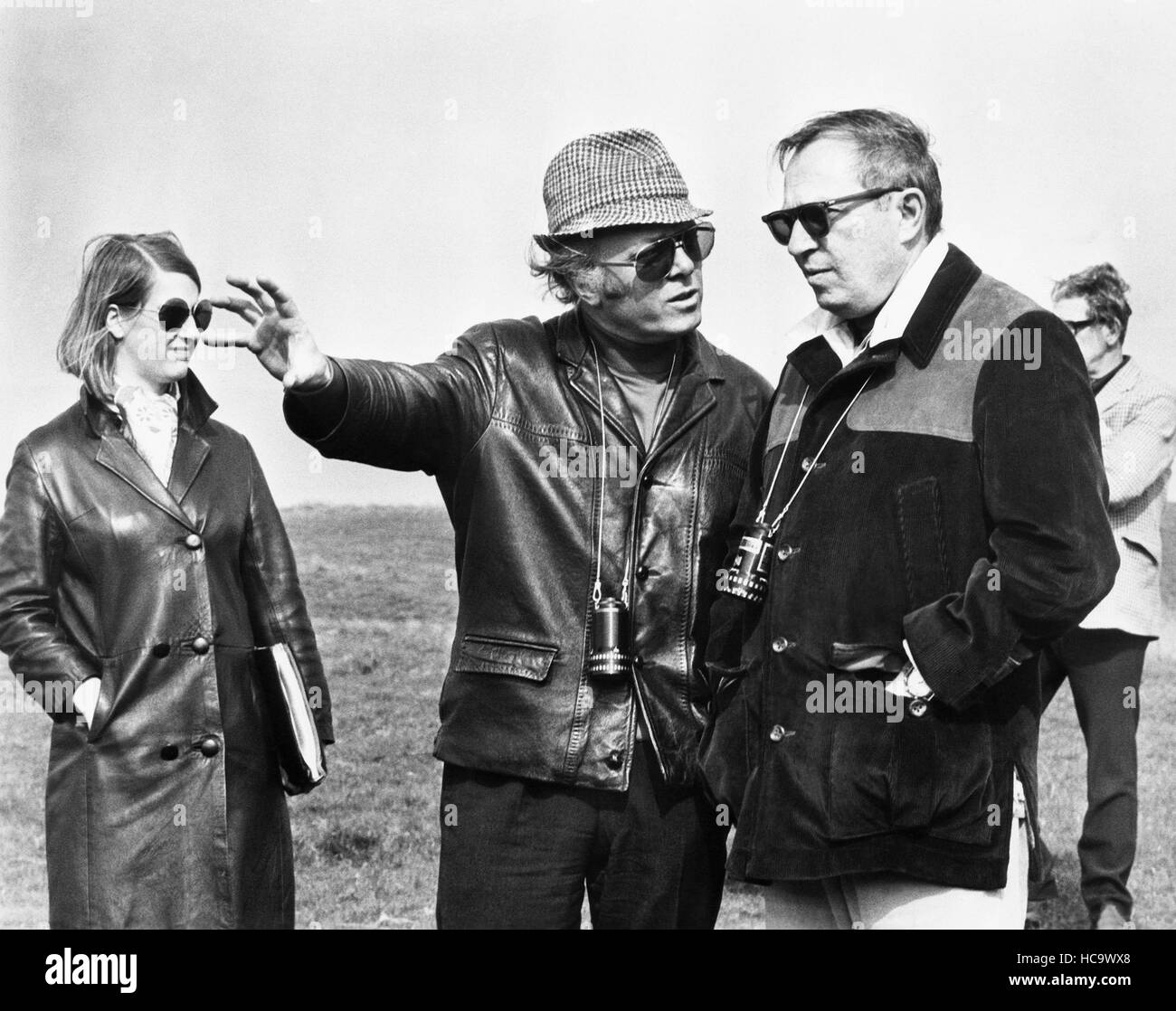 YOUNG WINSTON, director Richard Attenborough (hand outstretched ...