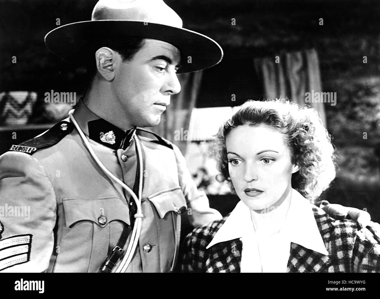 YUKON FLIGHT, from left: James Newill, Louise Stanley, 1940 Stock Photo ...