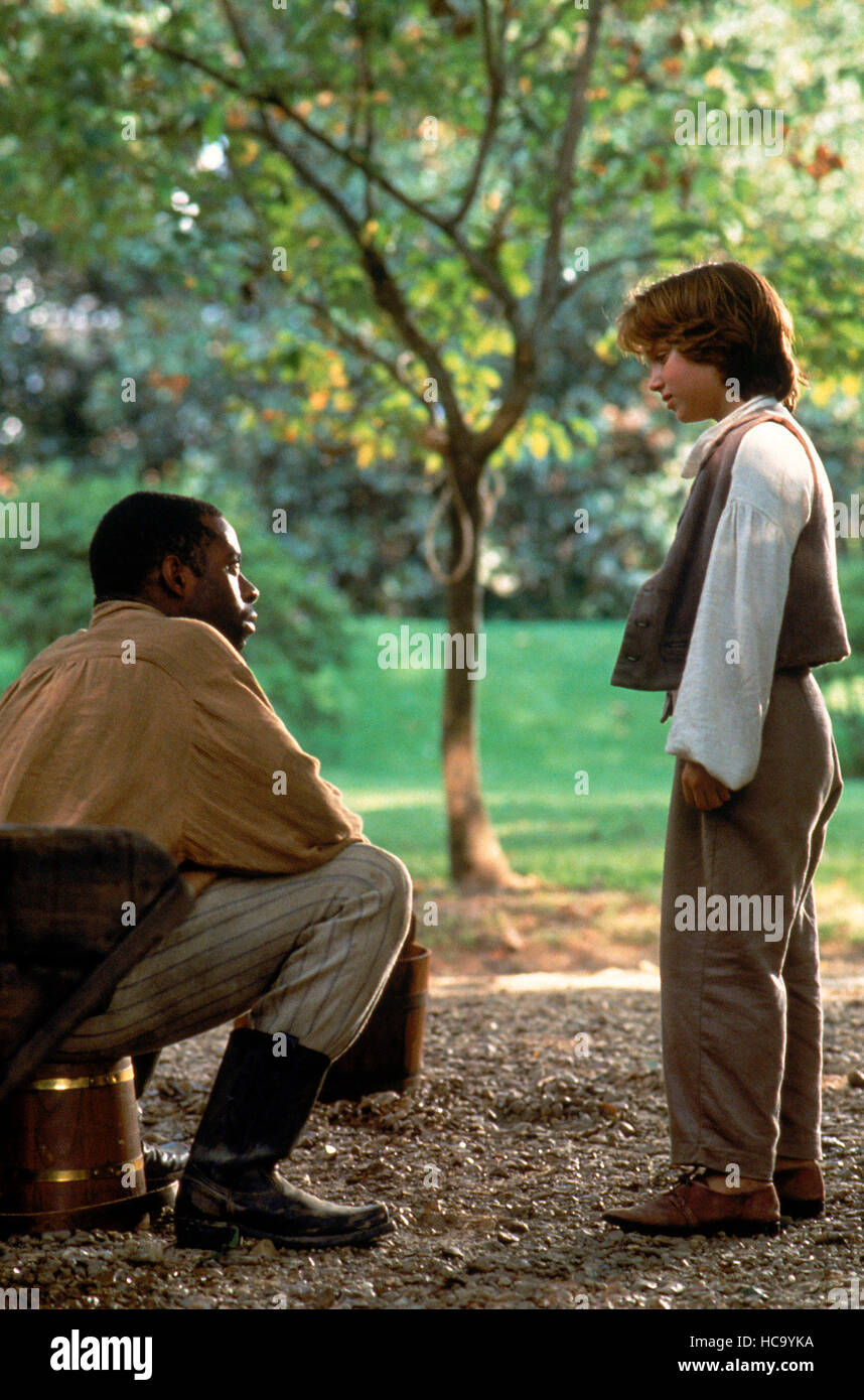 THE ADVENTURES OF HUCK FINN, from left: Courtney B. Vance, Elijah Wood ...