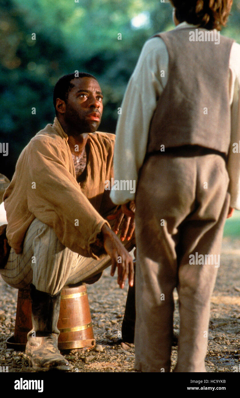 THE ADVENTURES OF HUCK FINN, from left: Courtney B. Vance, Elijah Wood ...