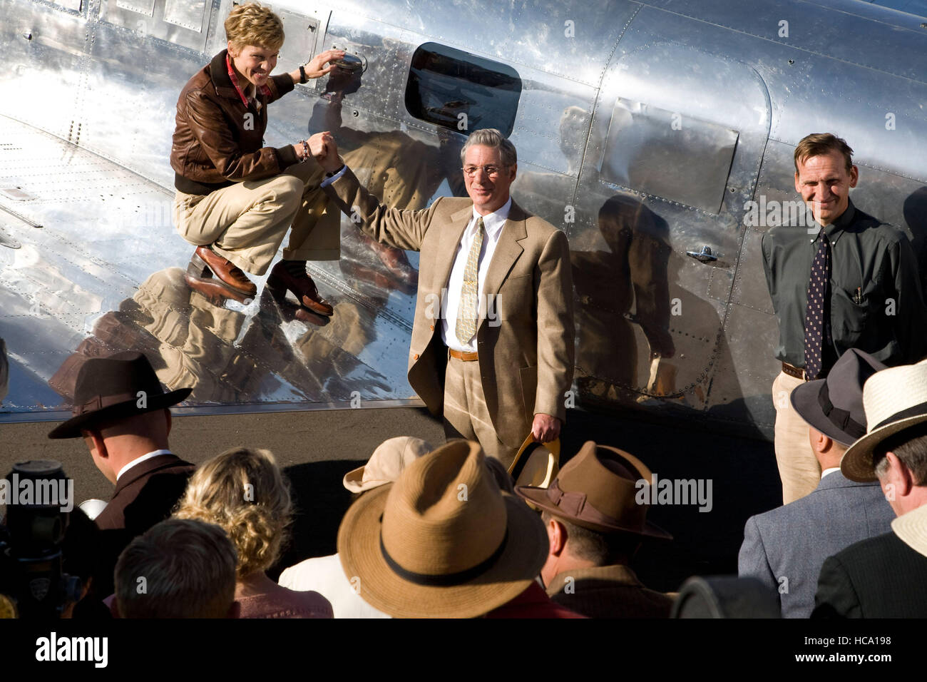 AMELIA, Hilary Swank as Amelia Earhart (left), Richard Gere (center of ...
