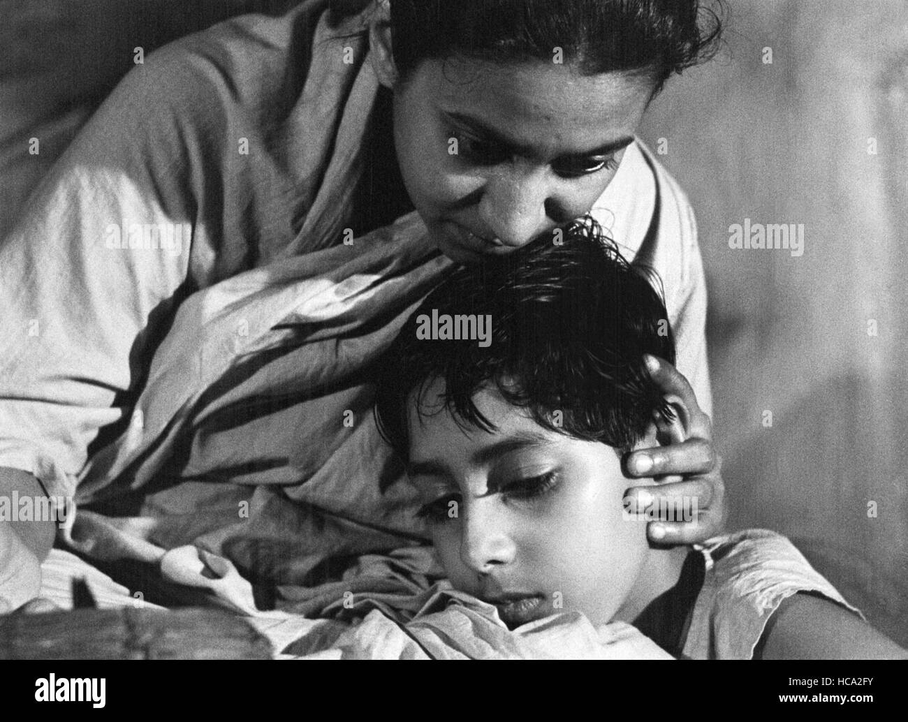 APARAJITO, from back: Karuna Bannerjee, Pinaki Sengupta, 1957 Stock ...