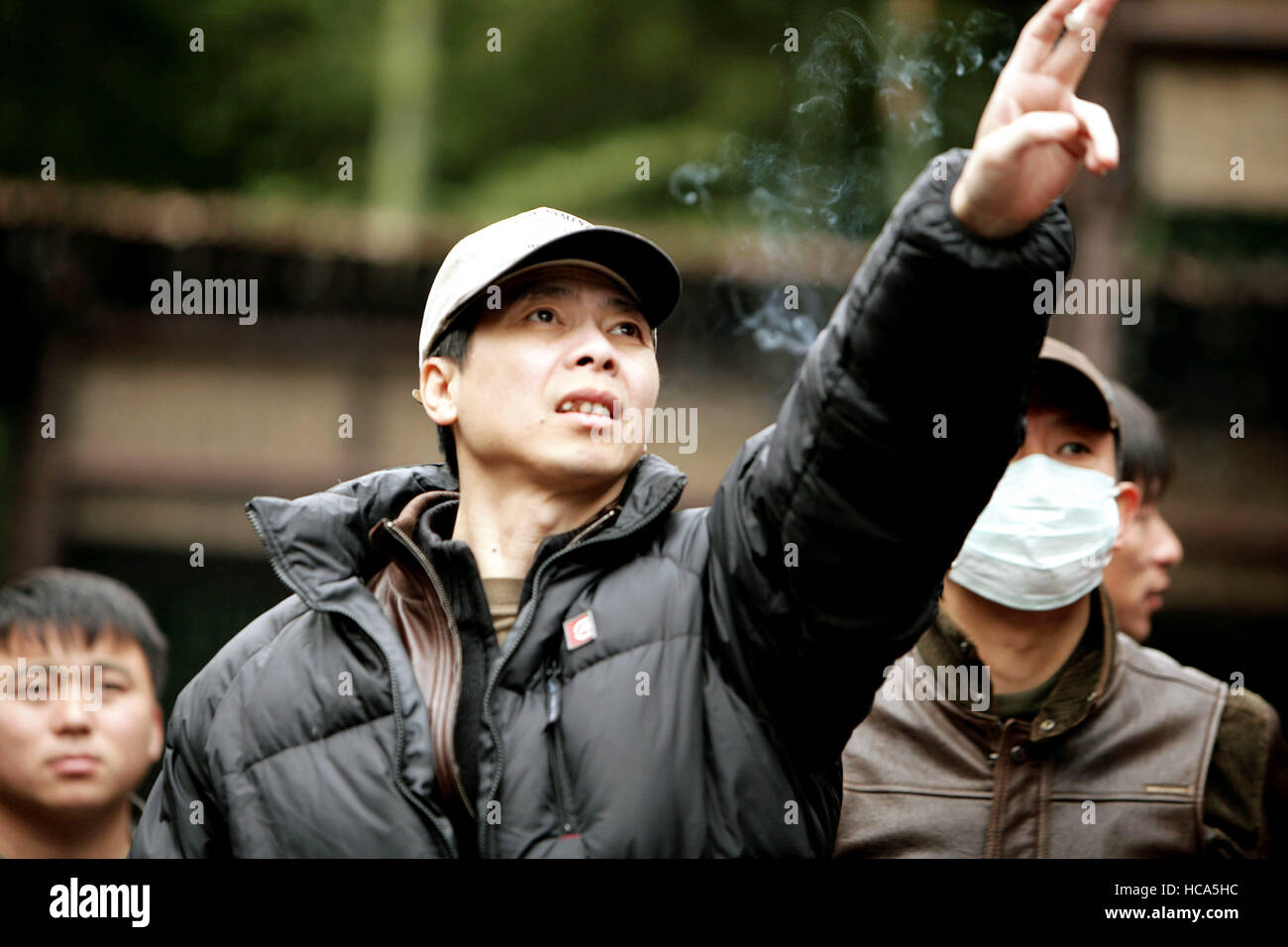 THE BANQUET, (aka YE YAN), writer/director Xiaogang Feng (center), on ...