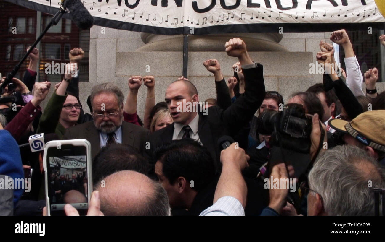 BIDDER 70, center: Tim DeChristopher with supporters outside Federal ...
