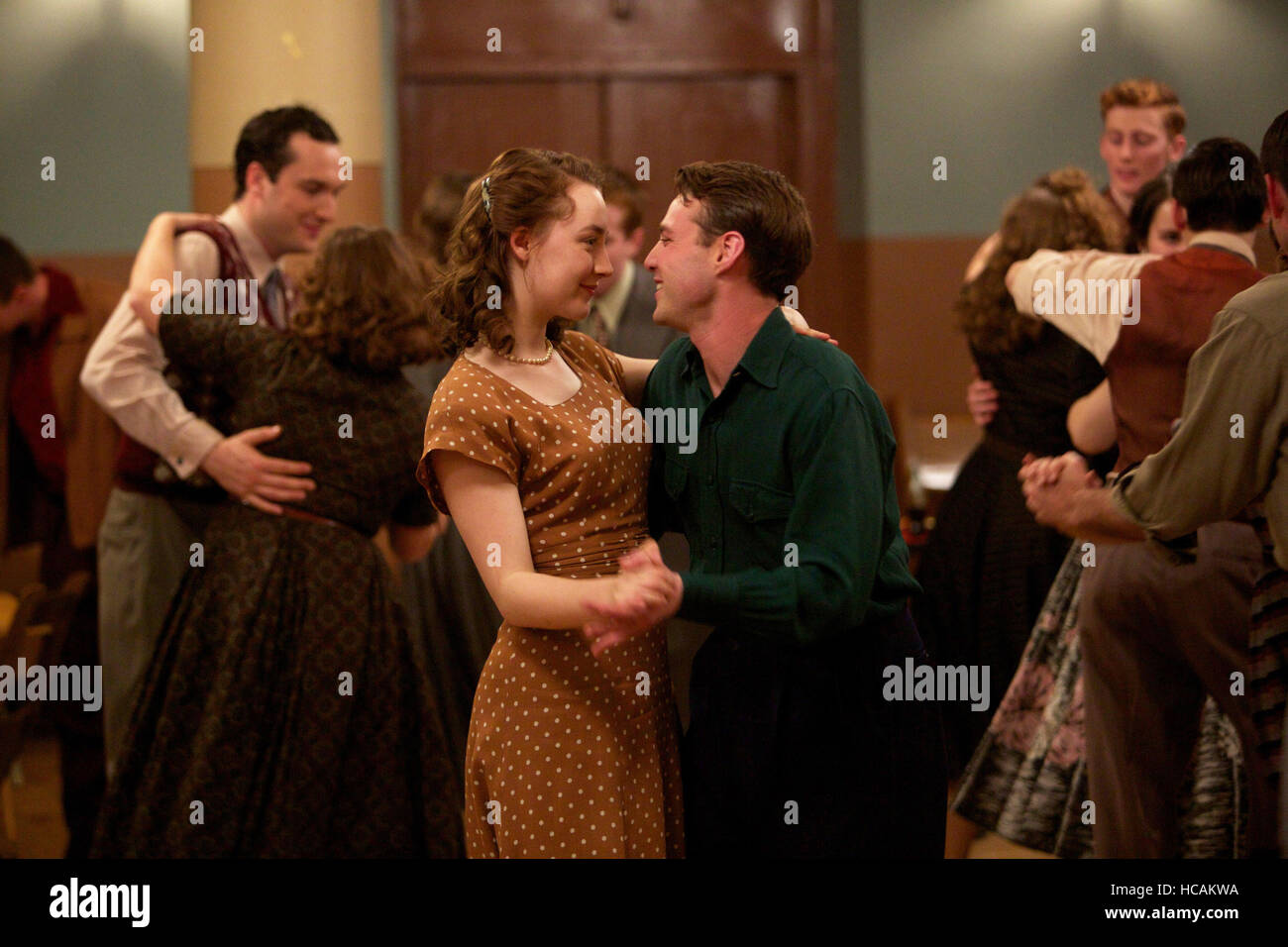 BROOKLYN, from left: Saoirse Ronan, Emory Cohen, 2015. ph: Kerry Brown / TM & copyright © Fox ...