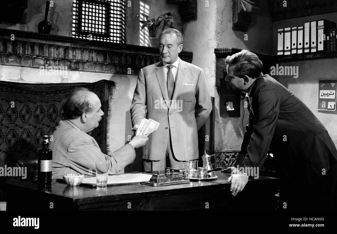 CAIRO, from left: Eric Pohlmann, George Sanders, John Meillon, 1963 ...