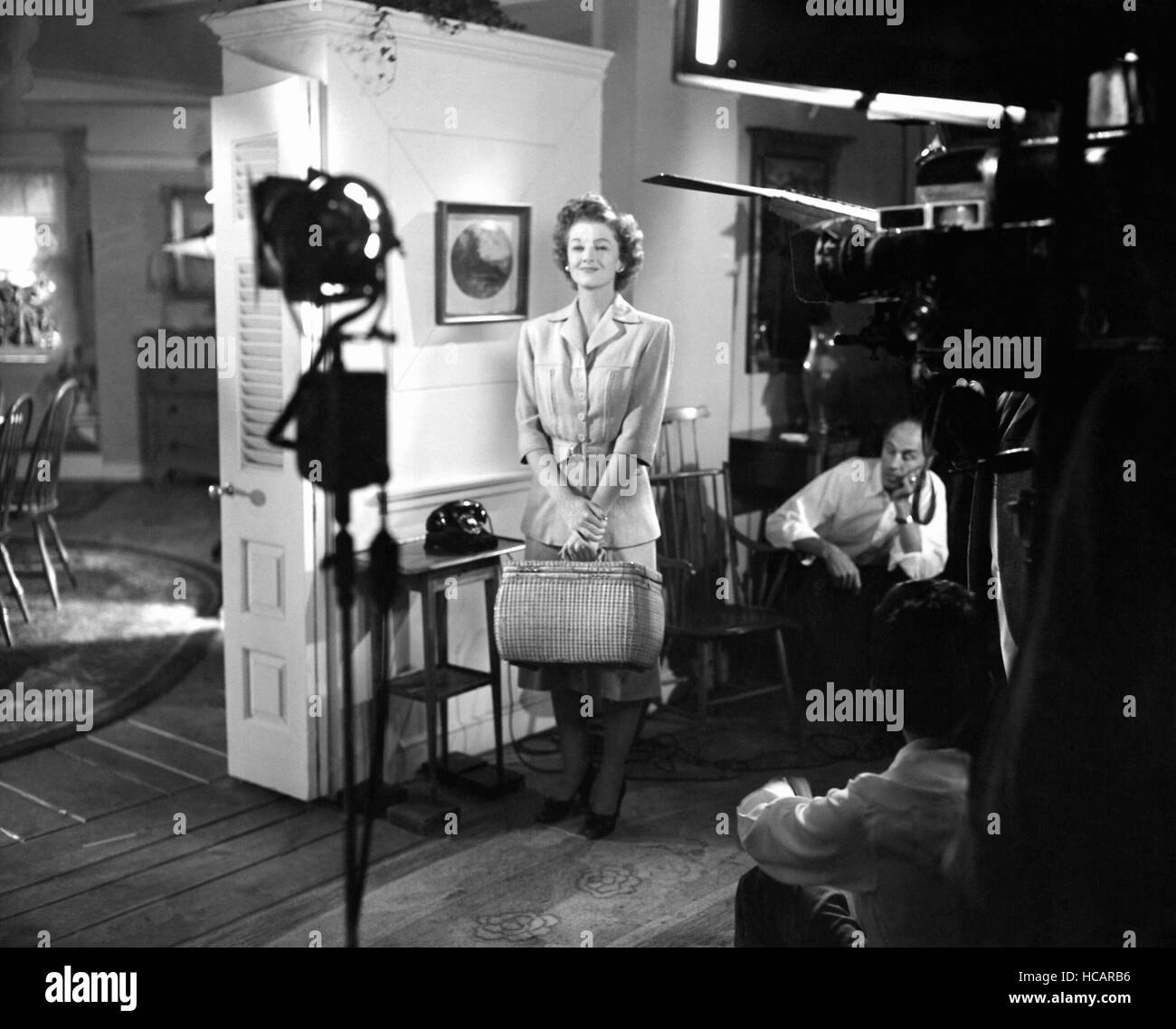 THE BACHELOR AND THE BOBBY-SOXER, Myrna Loy preparing to film on set ...