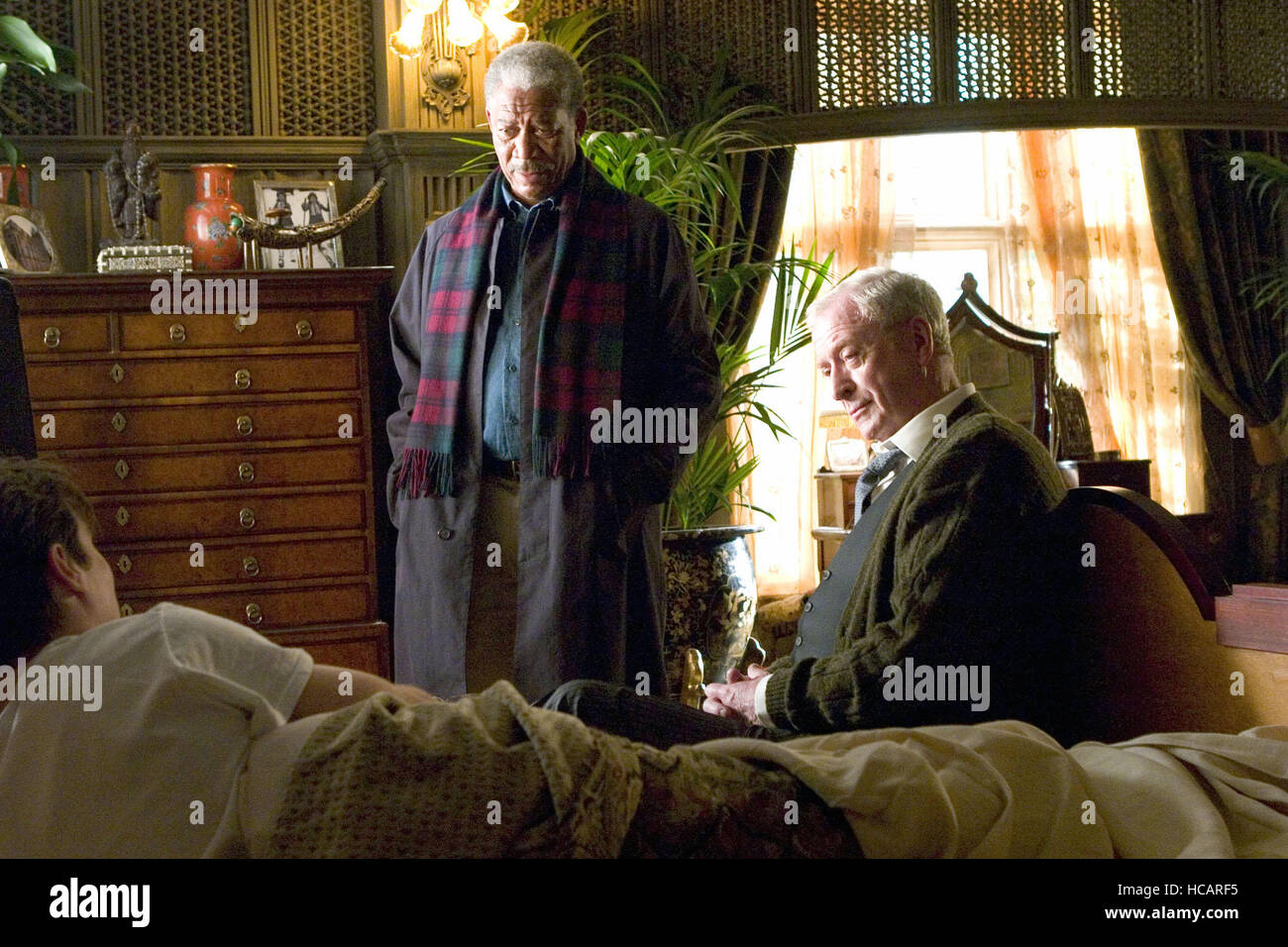 BATMAN BEGINS, Gus Lewis, Morgan Freeman, Michael Caine, 2005, (c ...