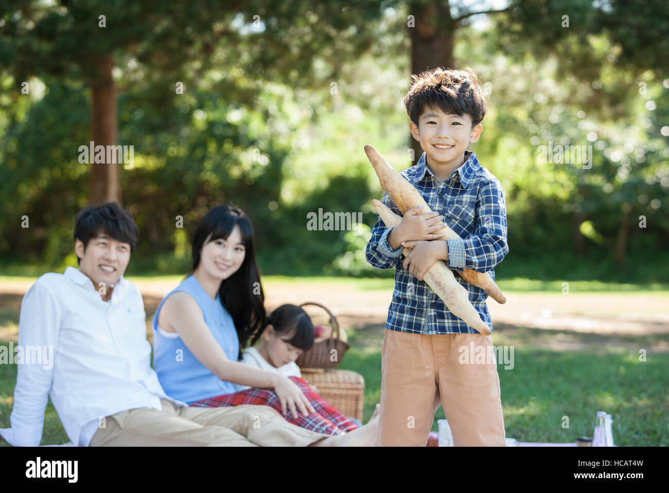 Harmonious family having picnic Stock Photo - Alamy