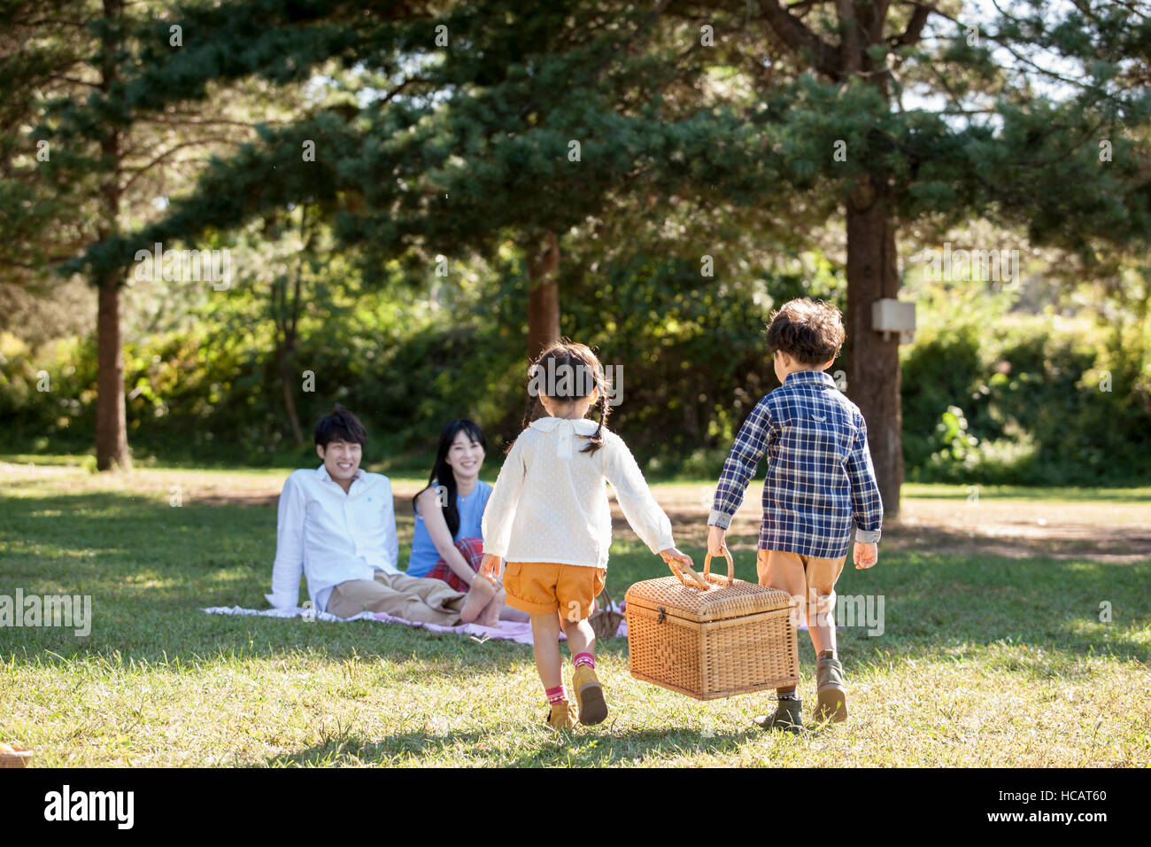 Harmonious family having picnic Stock Photo - Alamy