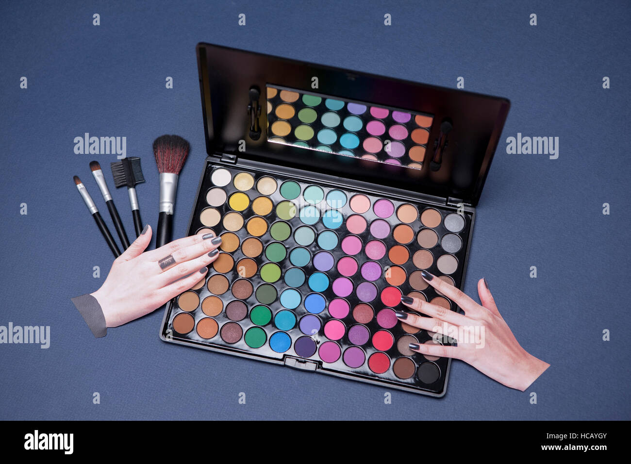 Hands touching various cosmetic products and beauty supplies Stock ...