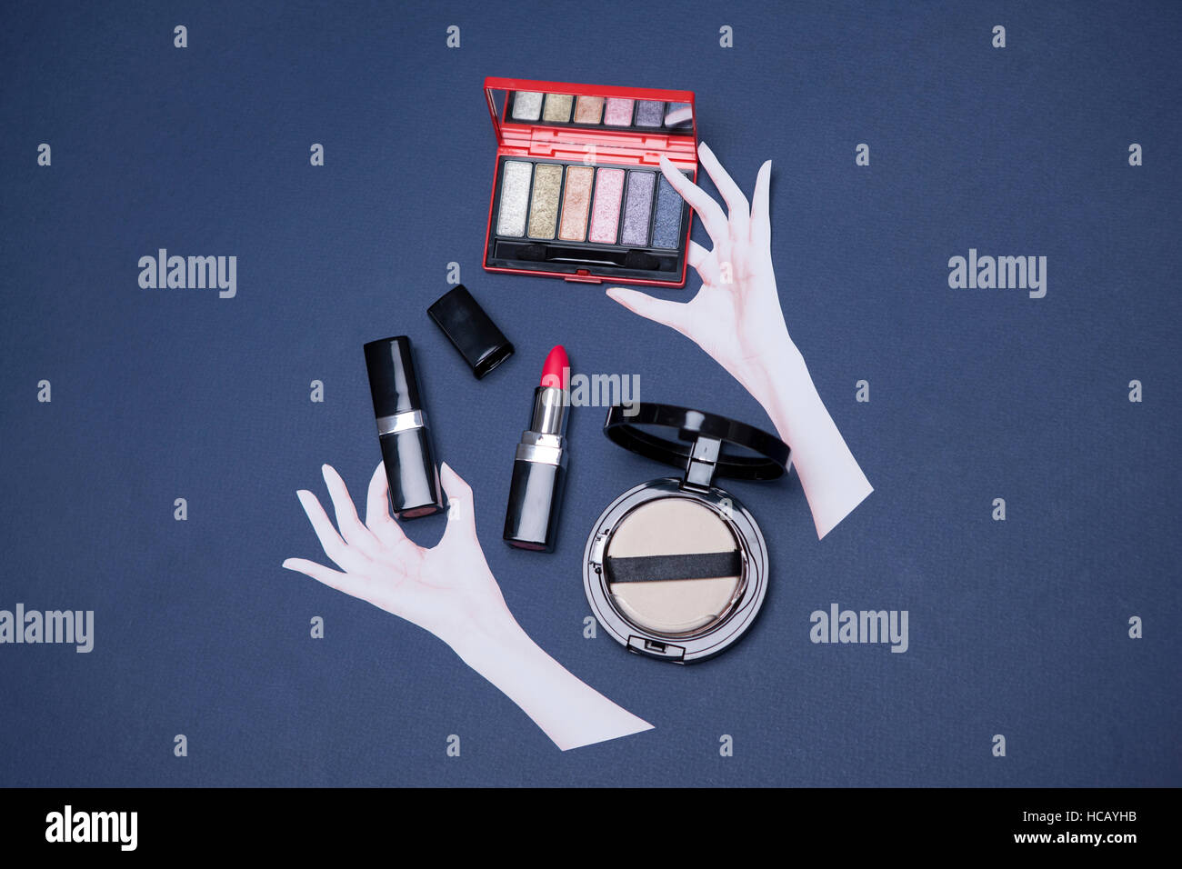 Hands with various cosmetic products Stock Photo - Alamy