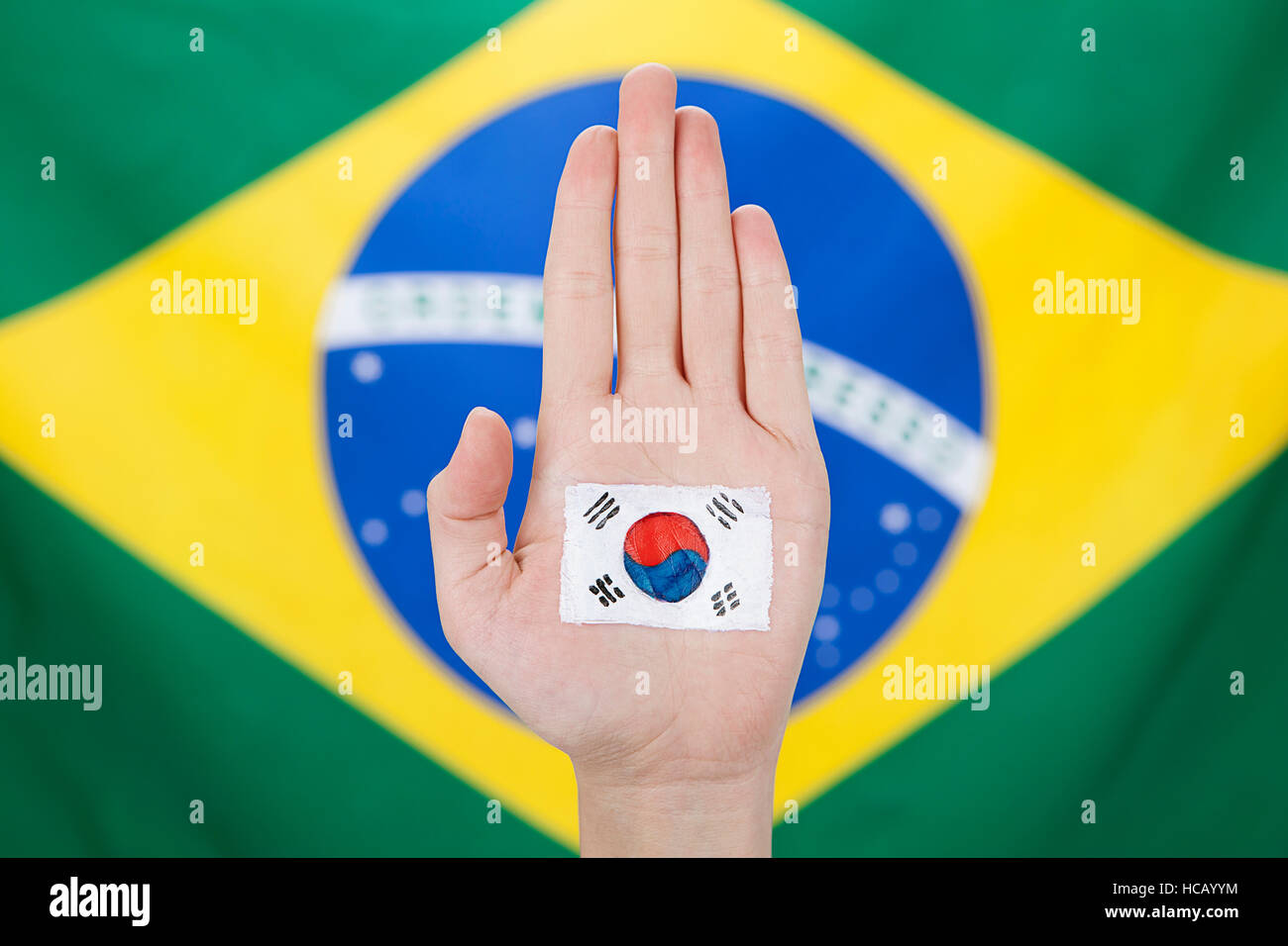 Hand with Korean flag at Olympic Games Stock Photo - Alamy