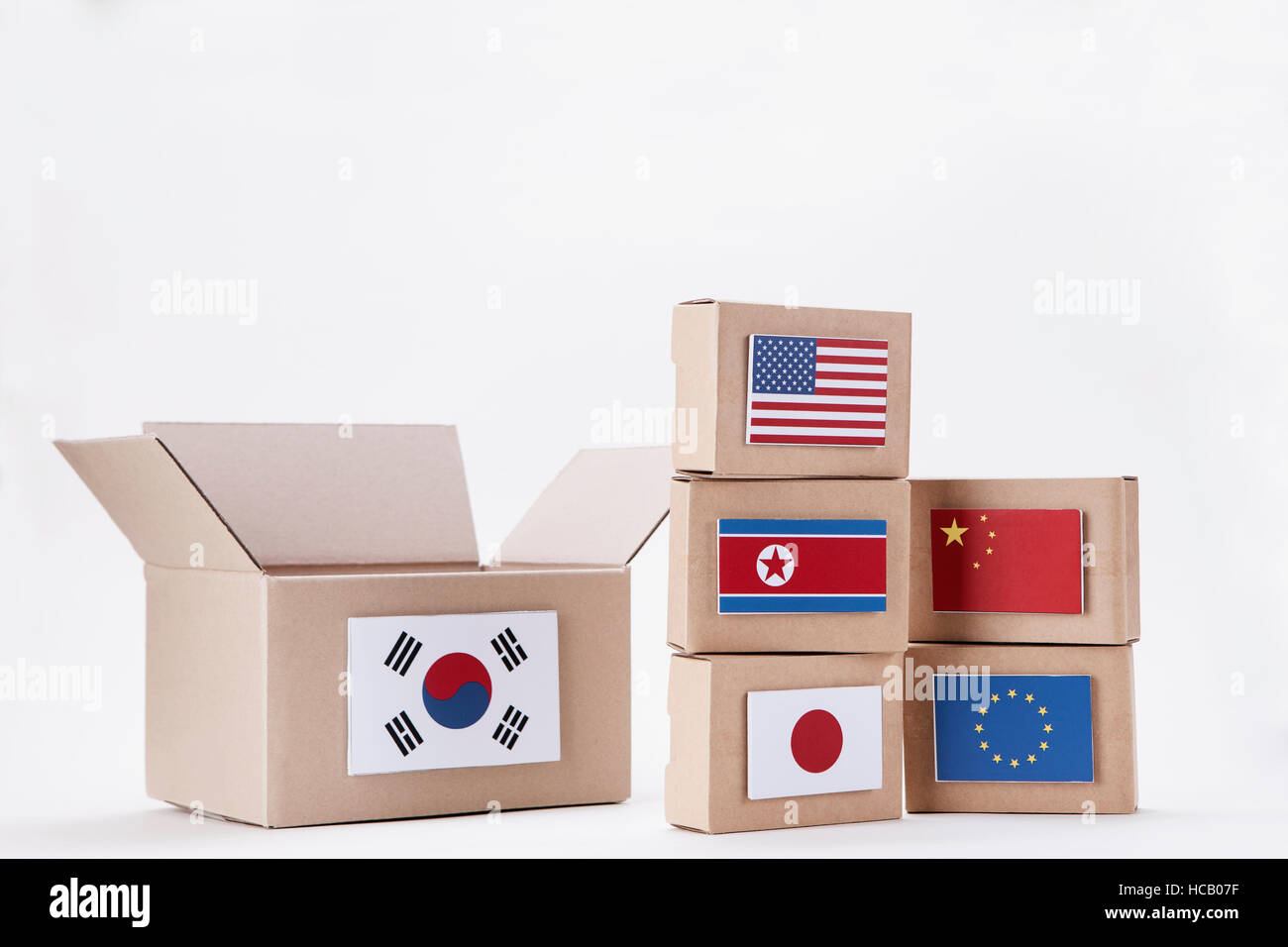 Boxes with various national flags Stock Photo - Alamy