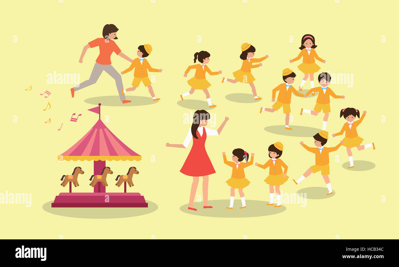 Kindergarten children enjoying at amusement park Stock Photo - Alamy