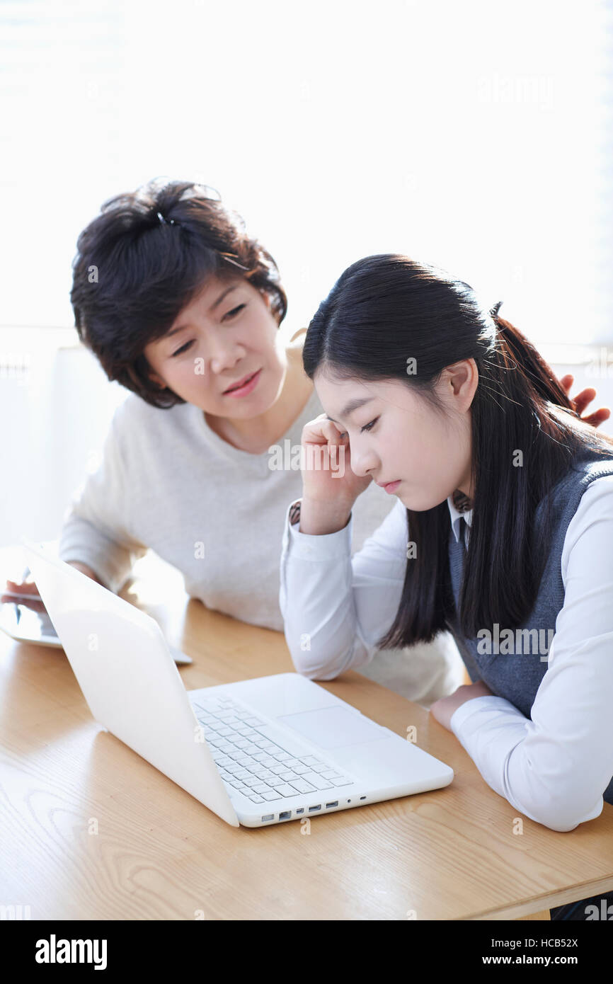 Loving mother cheering for her stressful middle school girl Stock Photo ...