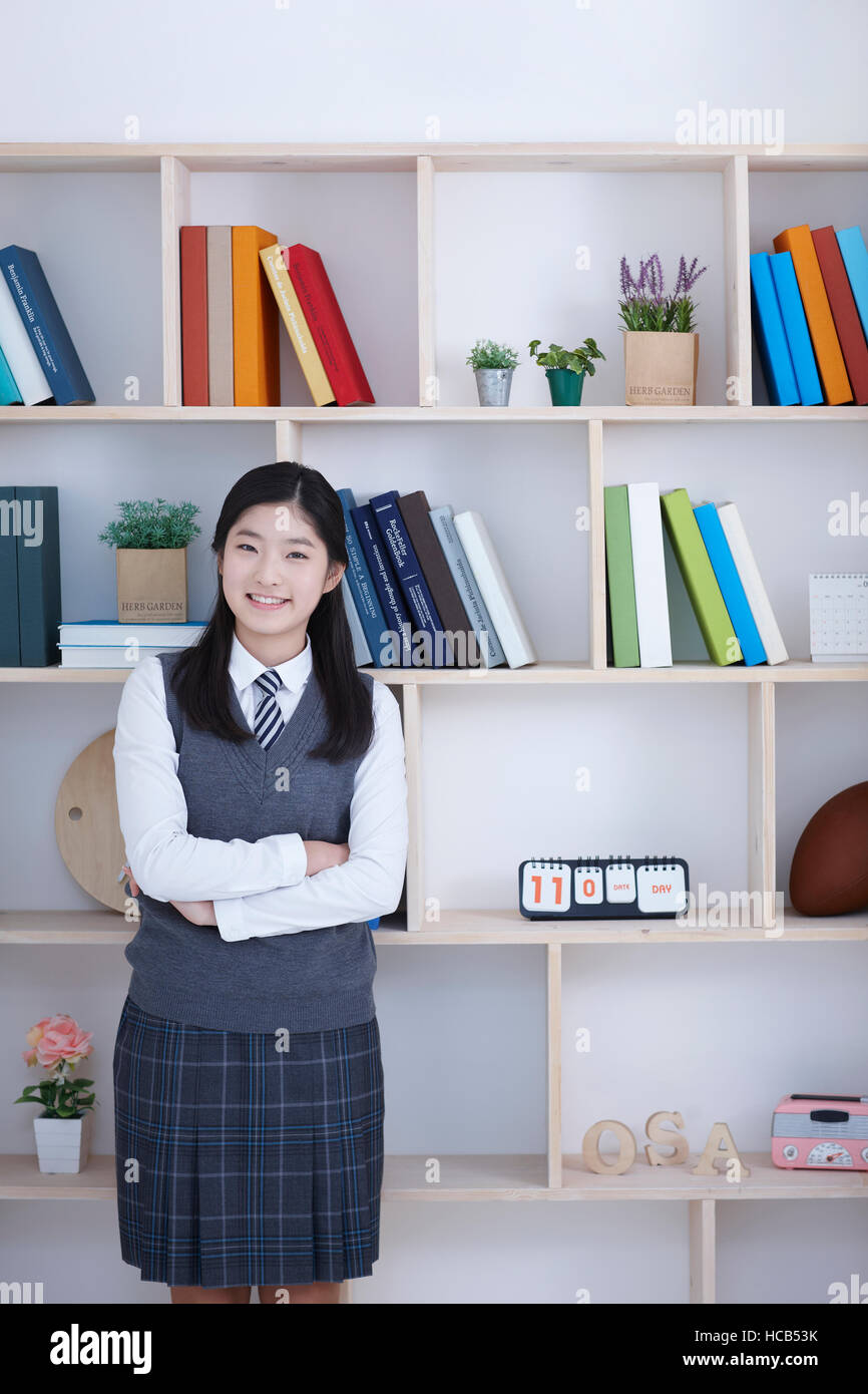 Smiling confident middle school girl Stock Photo - Alamy