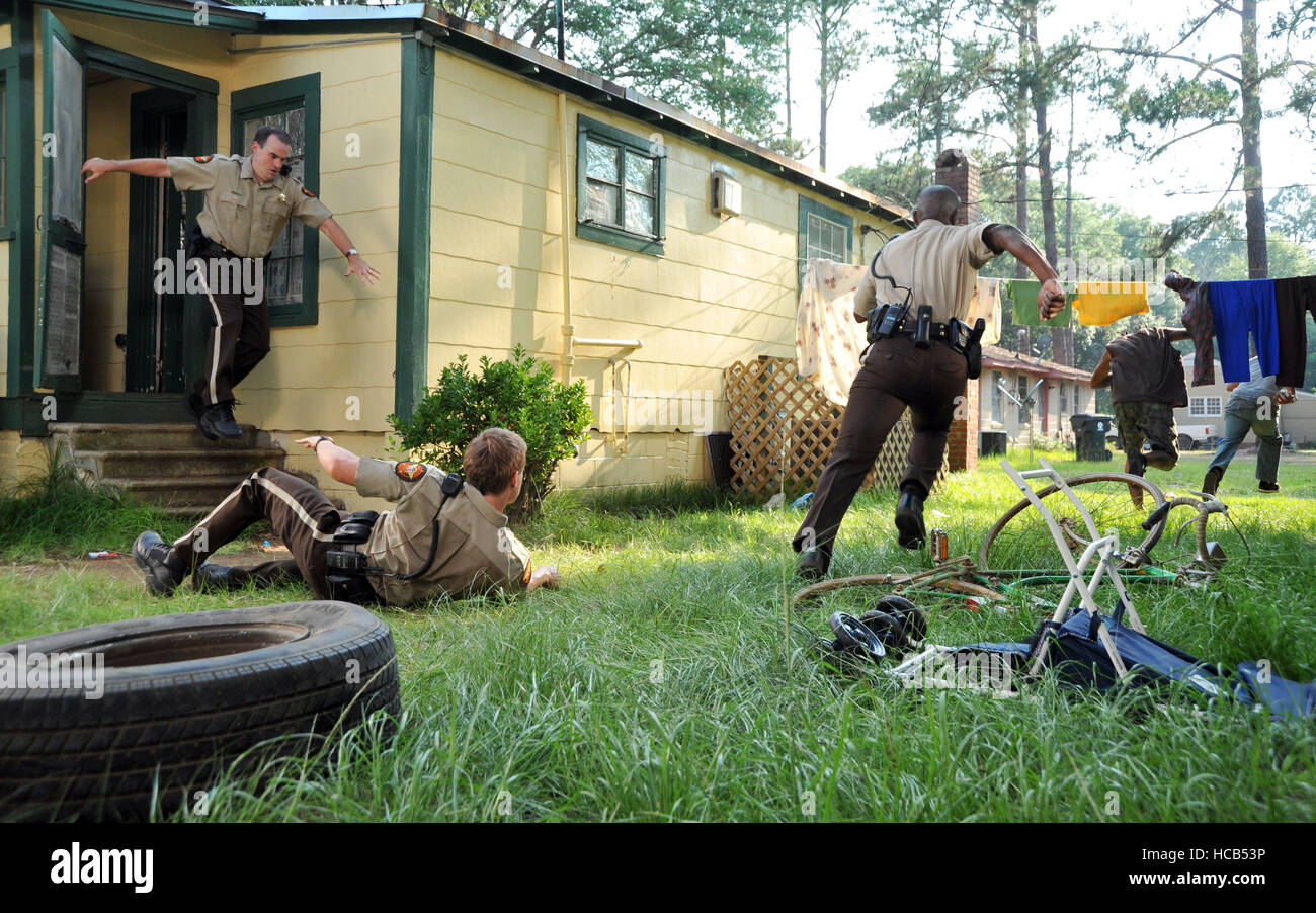 COURAGEOUS, foreground from left: Alex Kendrick, Ben Davies, Ken Bevel ...