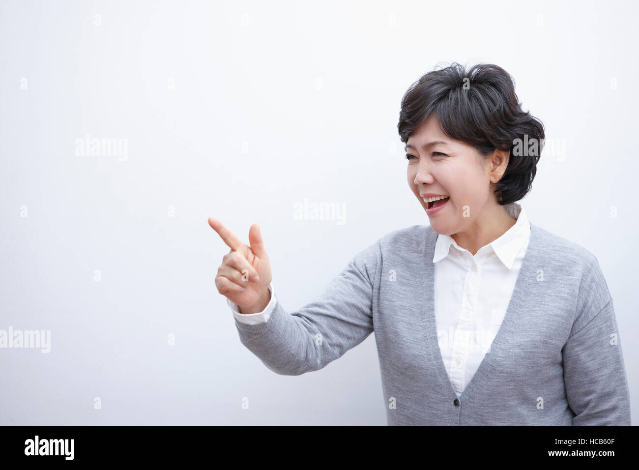 Portrait of middle aged woman scolding Stock Photo - Alamy