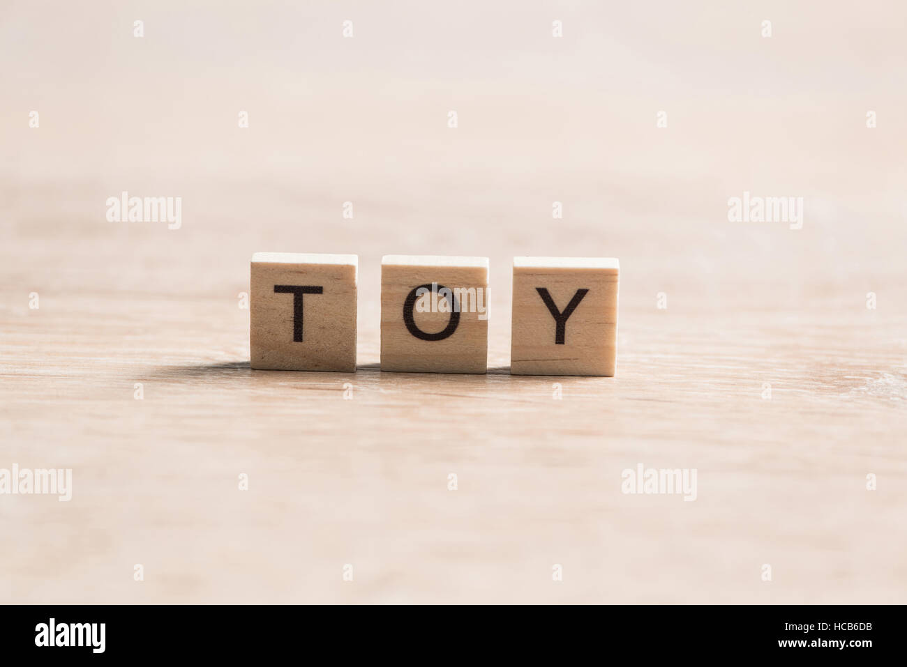 word of wooden elements with letters Stock Photo - Alamy