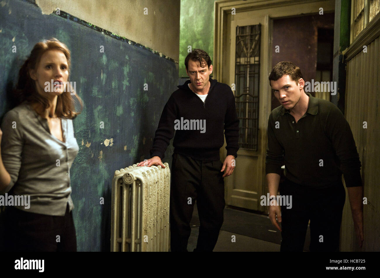 THE DEBT, from left: Jessica Chastain, Marton Csokas, Sam Worthington ...