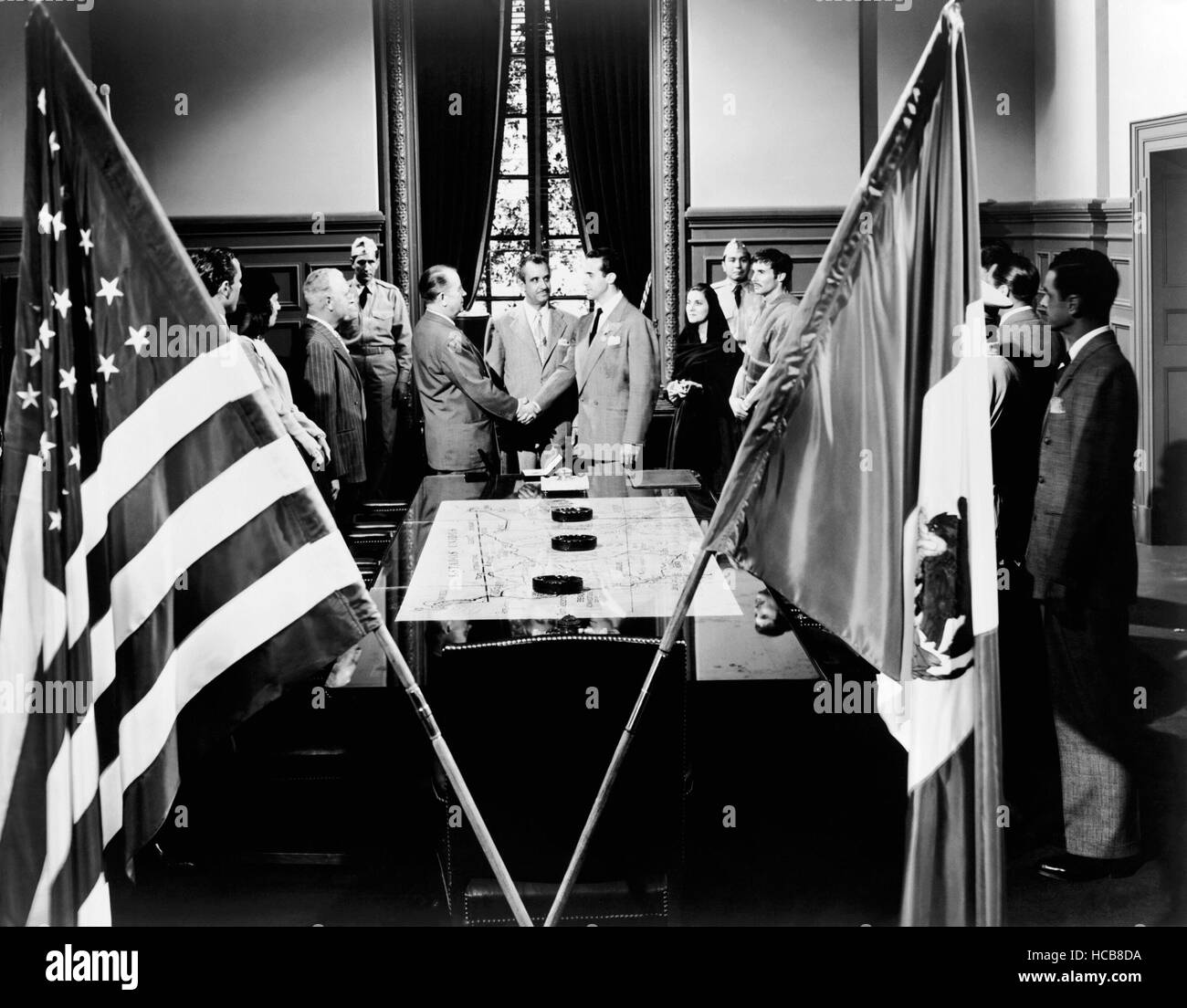 BORDER INCIDENT, center, from left: Harry Antrim (shaking hands ...