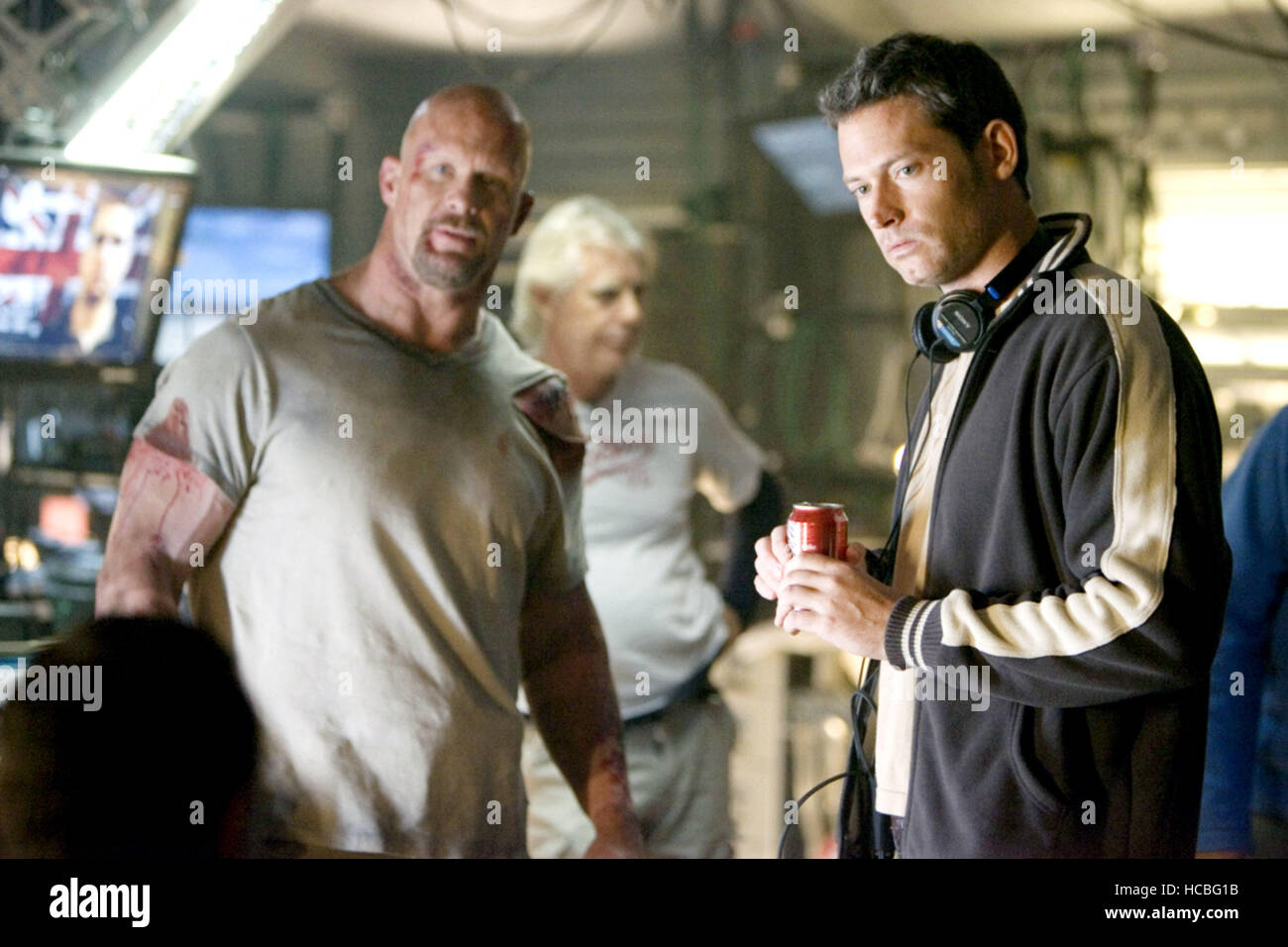 THE CONDEMNED, Steve Austin, director Scott Wiper, on set, 2007. ©Lions ...