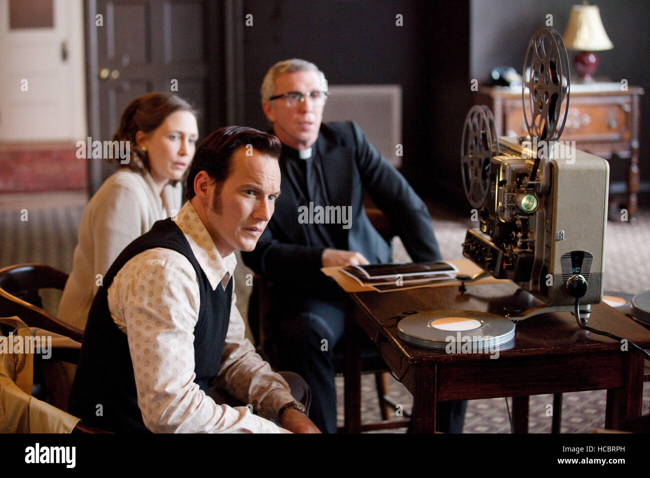 THE CONJURING, from left: Vera Farmiga, Patrick Wilson, Steve Coulter ...