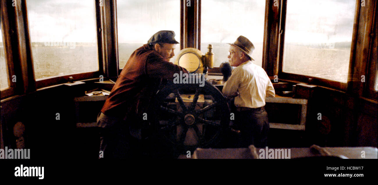 THE CURIOUS CASE OF BENJAMIN BUTTON, from left: Jared Harris, Brad Pitt ...