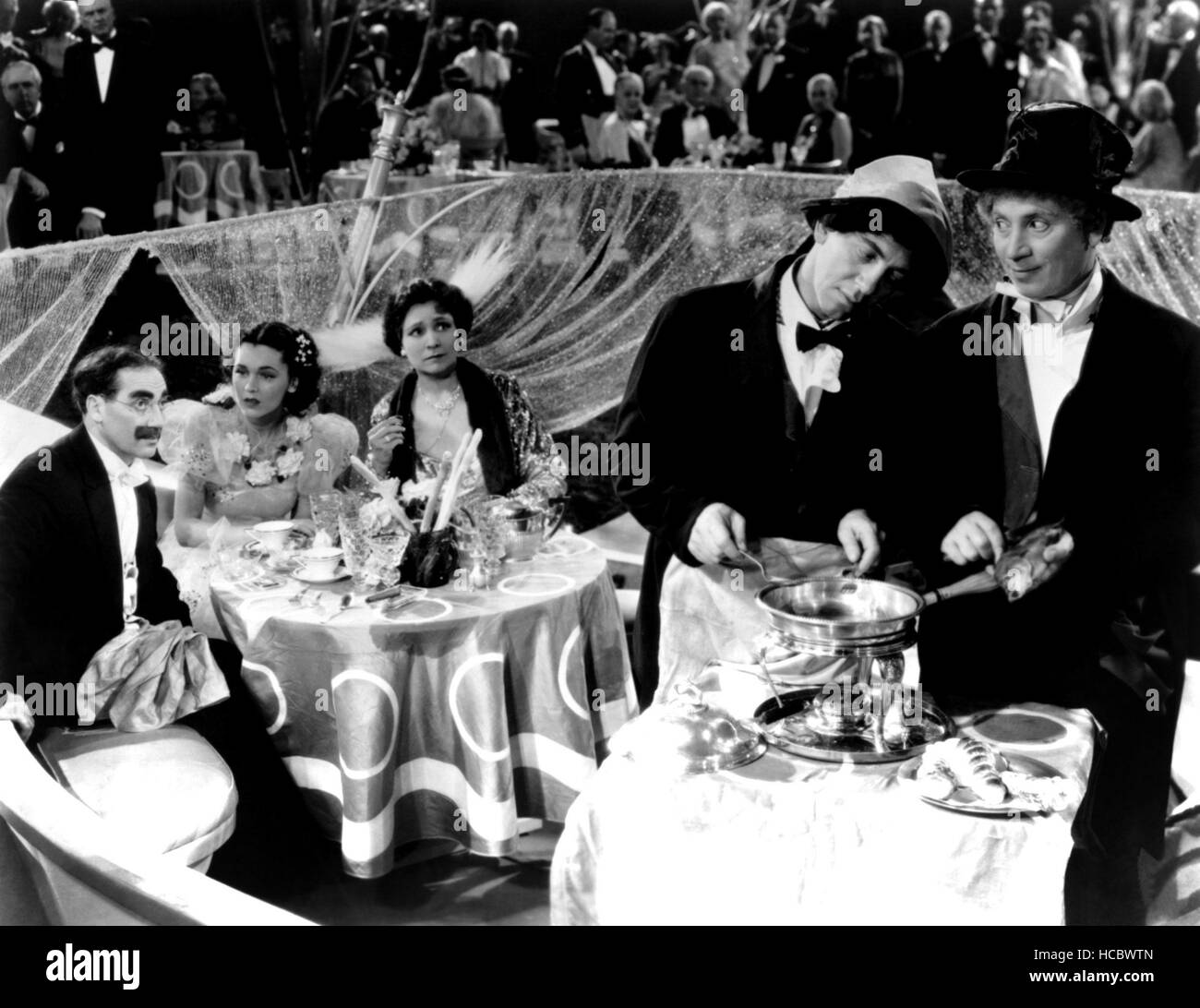 A DAY AT THE RACES, from left: Groucho Marx, Maureen O'Sullivan ...