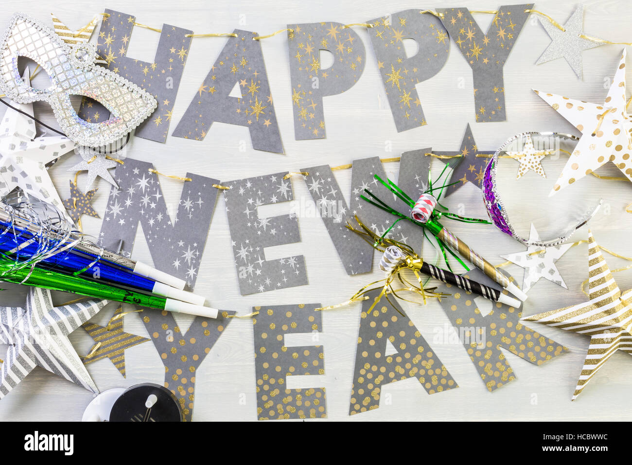 New Year party silver decorations on the table Stock Photo - Alamy