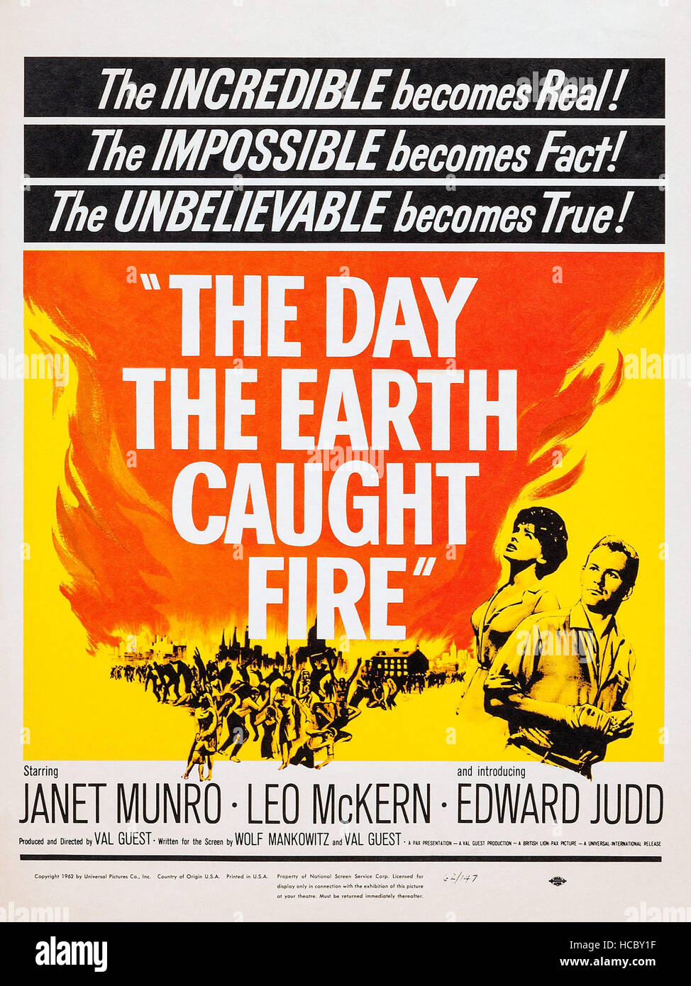 THE DAY THE EARTH CAUGHT FIRE, l-r: Janet Munro, Edward Judd on poster ...