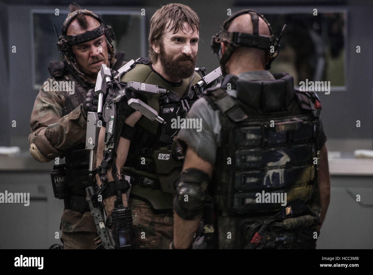 ELYSIUM, from left: Brandon Auret, Sharlto Copley, Josh Blacker, 2013. ph: Kimberley French ...