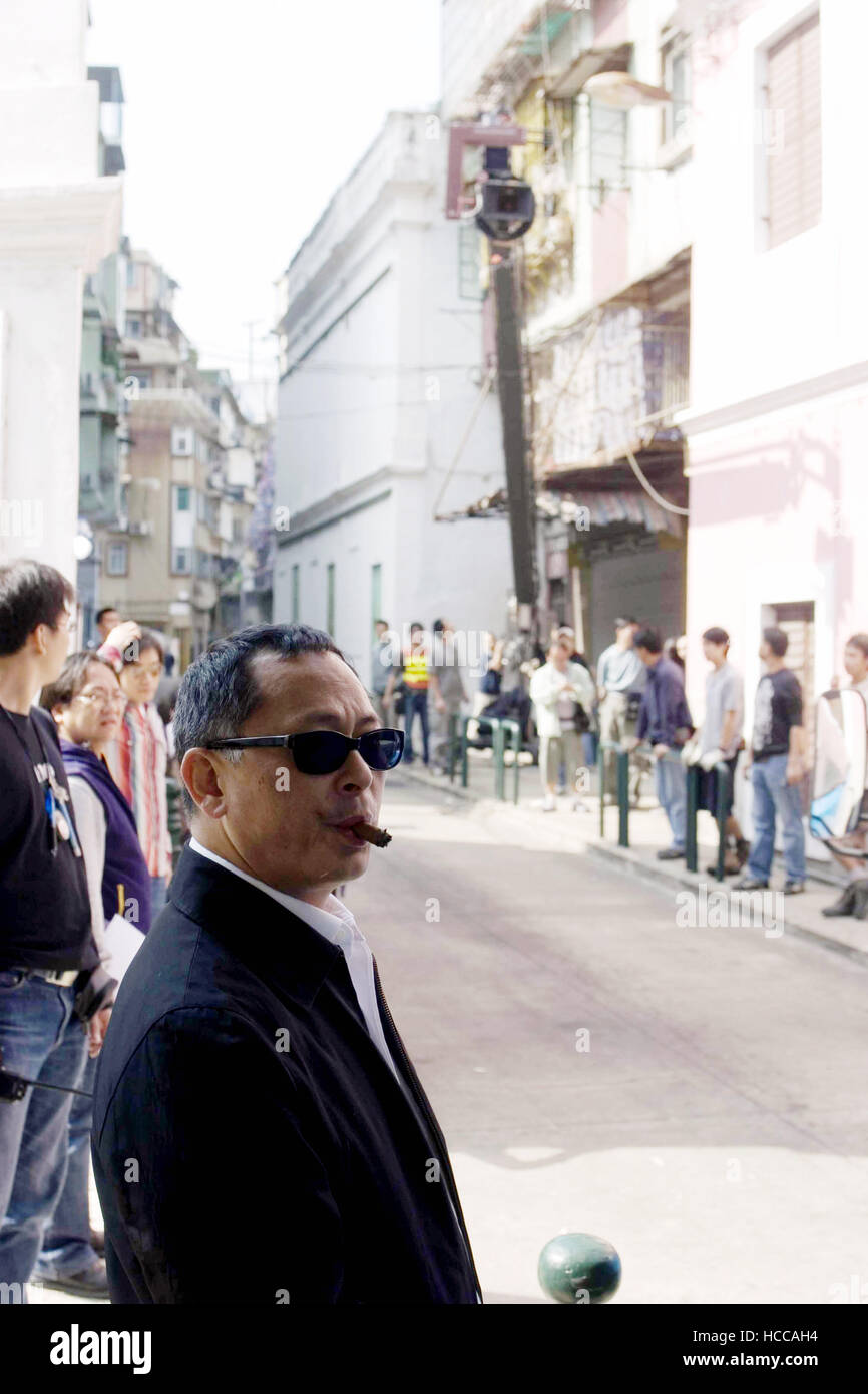 EXILED, (aka FONG JUK), foreground: director Johnny To, on set, 2006 ...