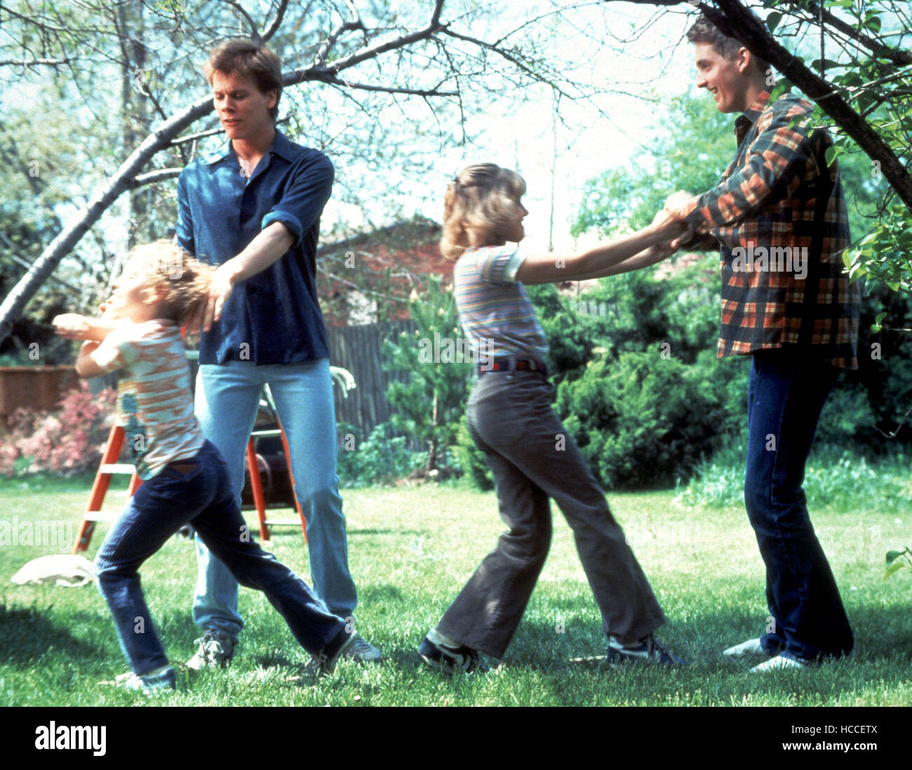 FOOTLOOSE, Kevin Bacon (second left), Christopher Penn (right), 1984 ...